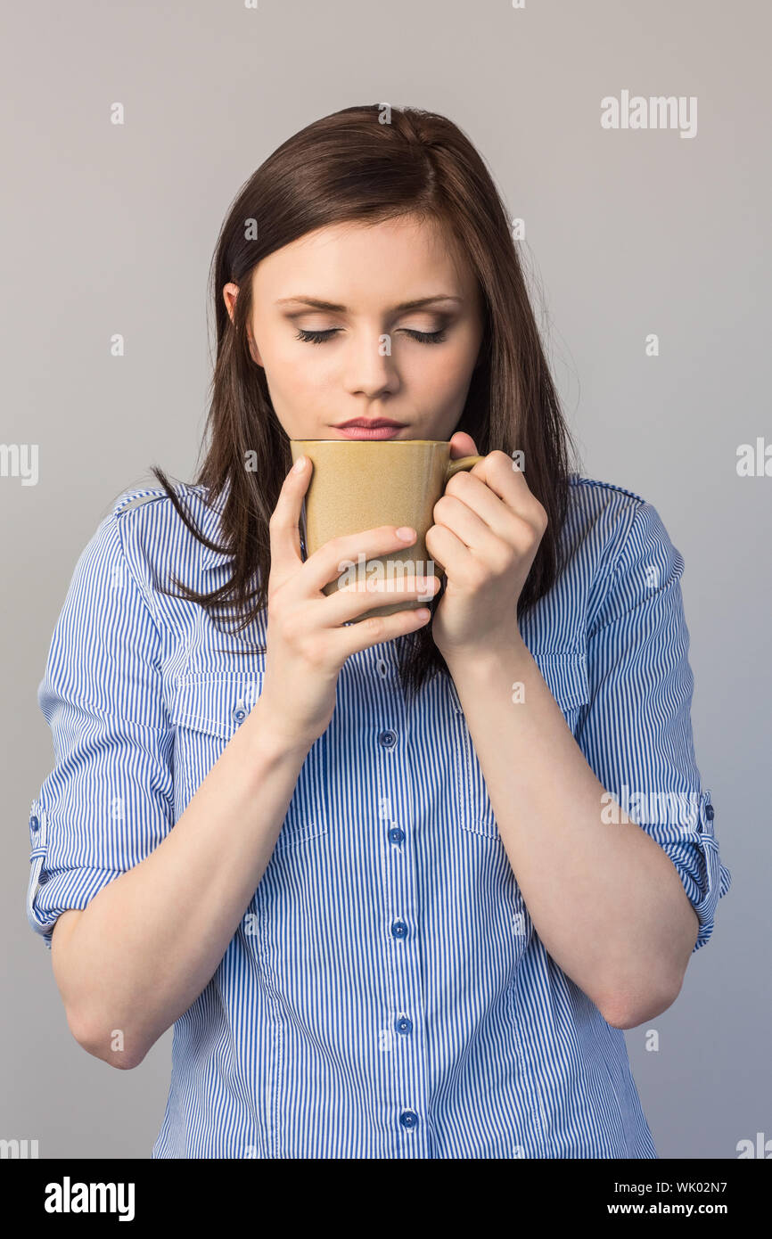 Pretty young woman mug hi-res stock photography and images - Alamy