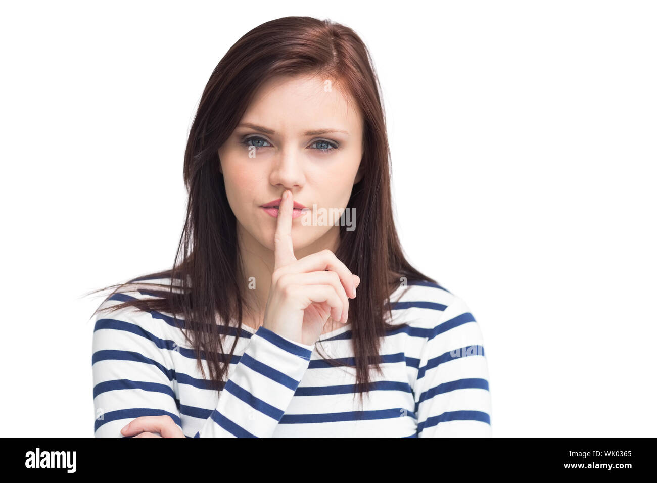 Content young brunette keeping secret Stock Photo - Alamy