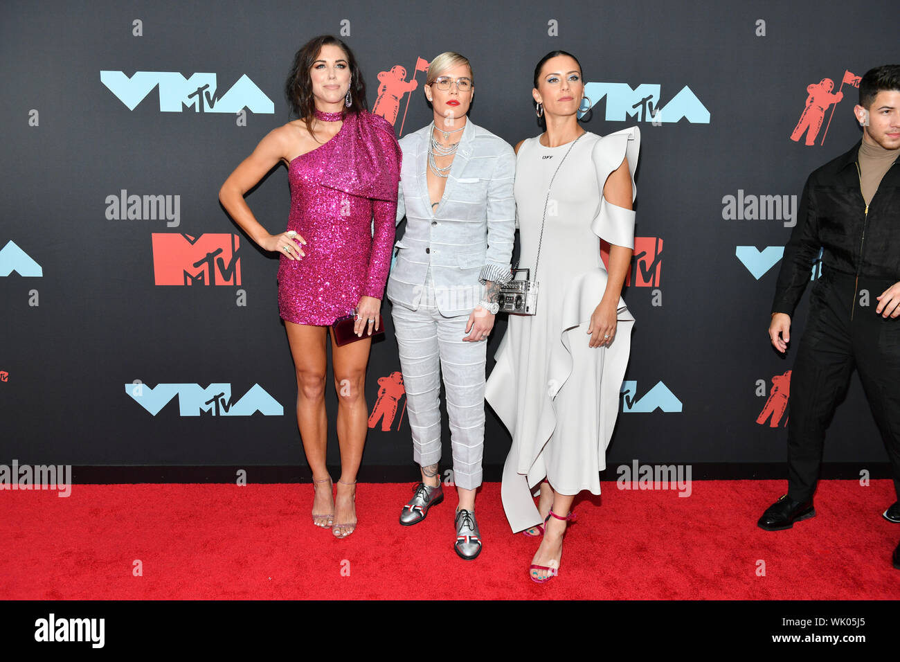 Alex Morgan, Ali Kreiger, and Ashlyn Harris attend the 2019 MTV Video ...