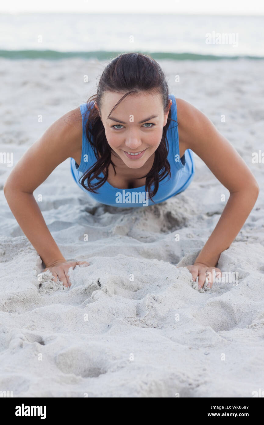 Young woman exercising sea hi-res stock photography and images - Alamy