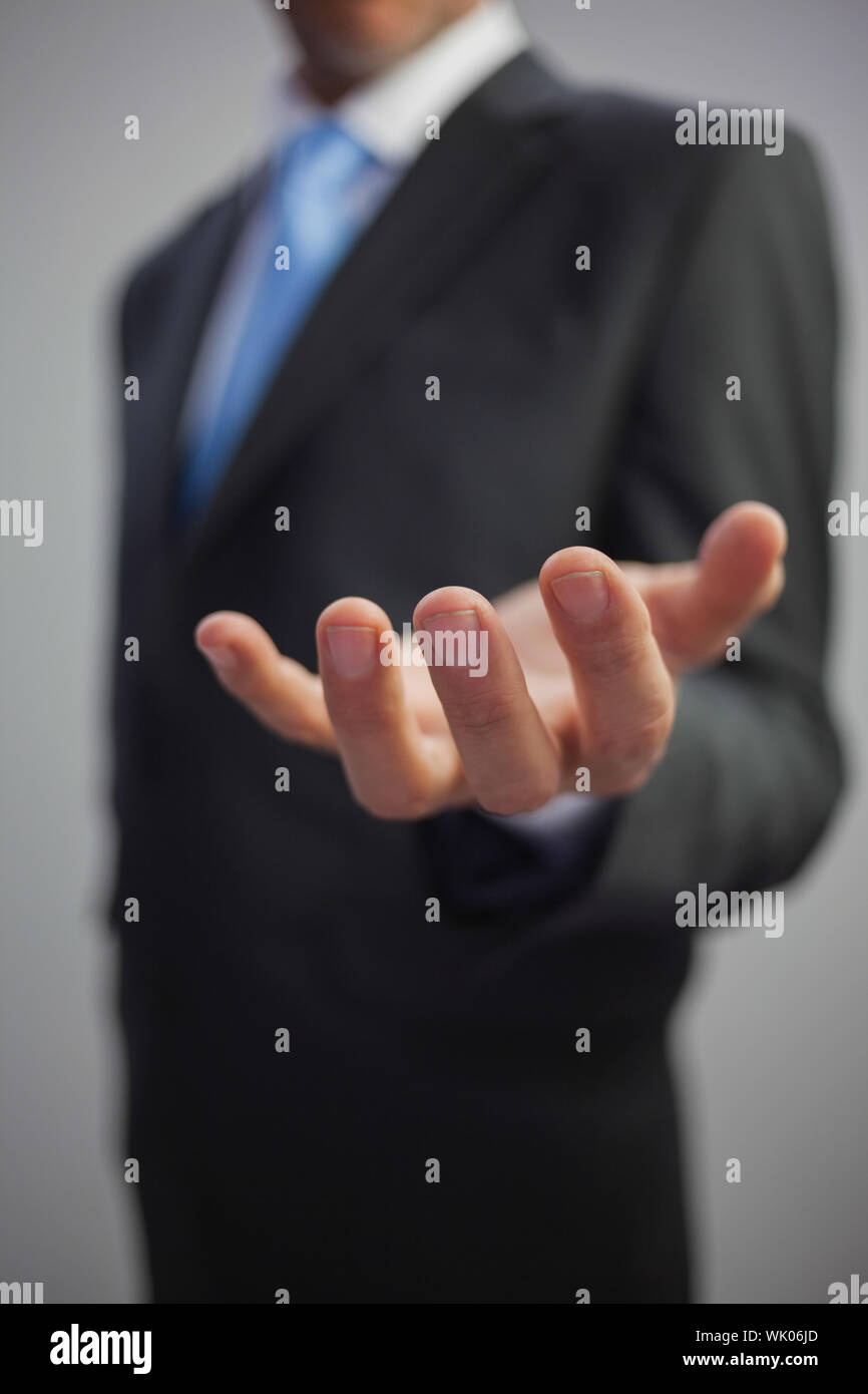 Close up of stylish businessman reaching out Stock Photo - Alamy