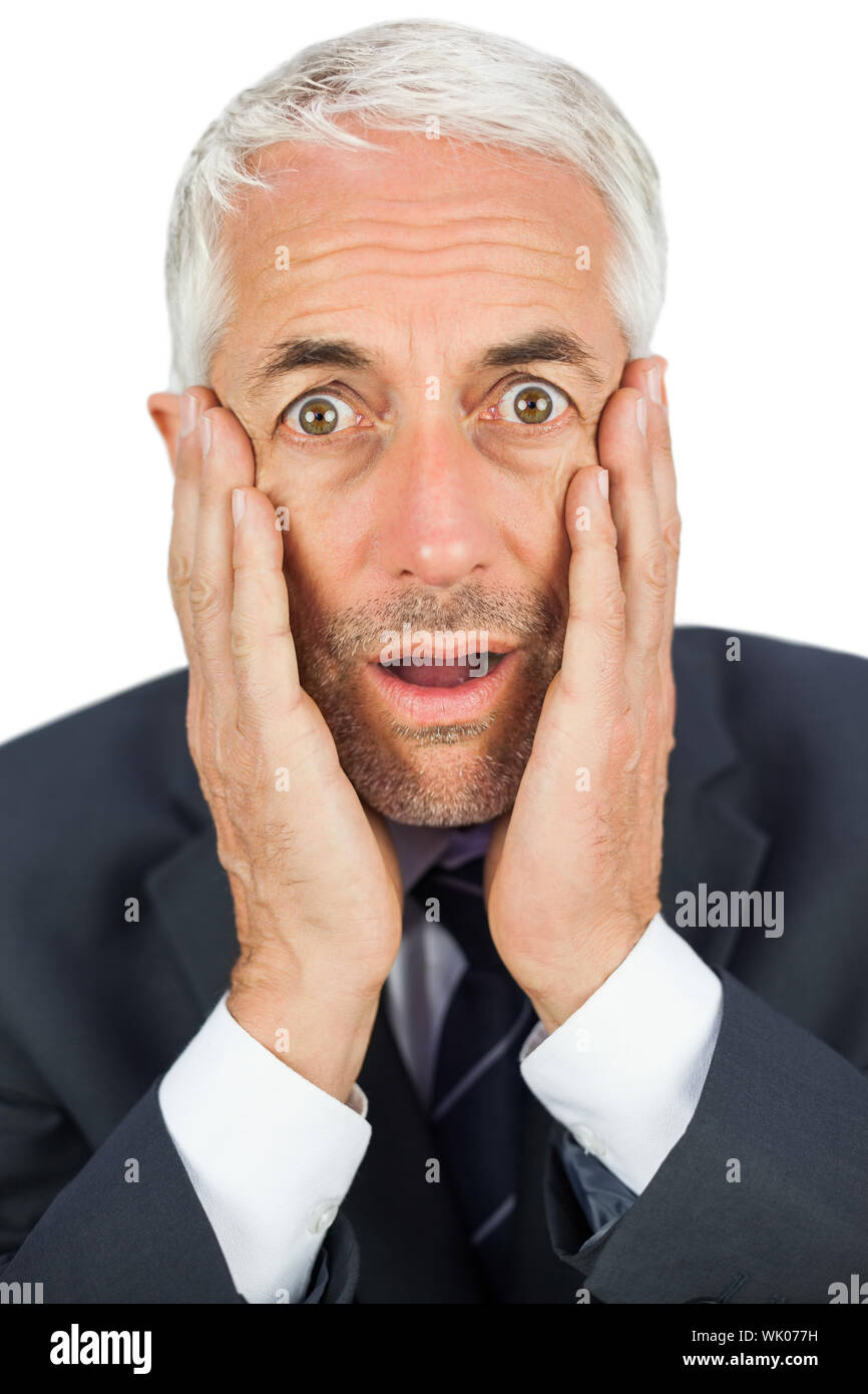 Upset businessman looking at camera Stock Photo - Alamy