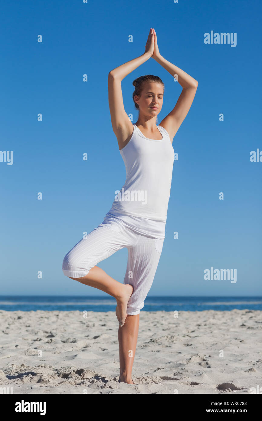 Woman in tree yoga pose Stock Photo - Alamy