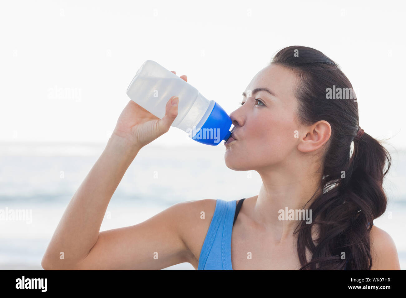 Drinking water after working out hi-res stock photography and images ...