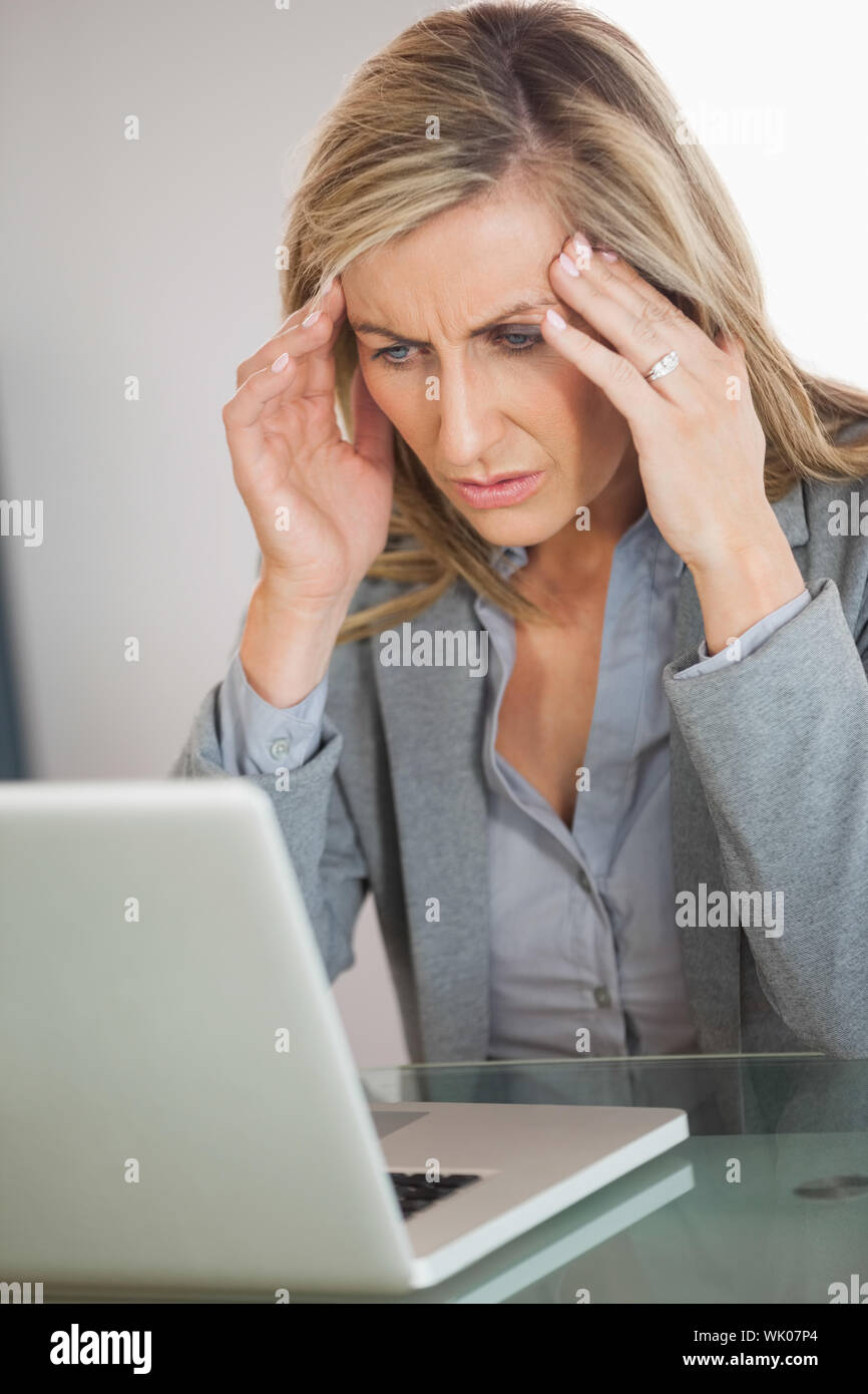 Stern woman and computer hi-res stock photography and images - Alamy