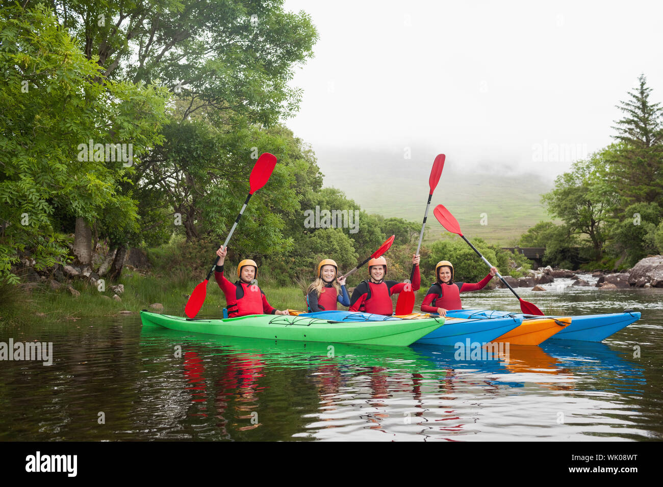 Young friends kayaking hi-res stock photography and images - Alamy