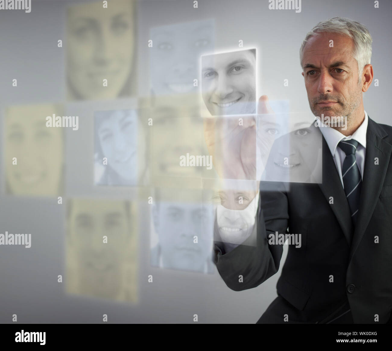 Stern human resources director selecting future employees Stock Photo ...