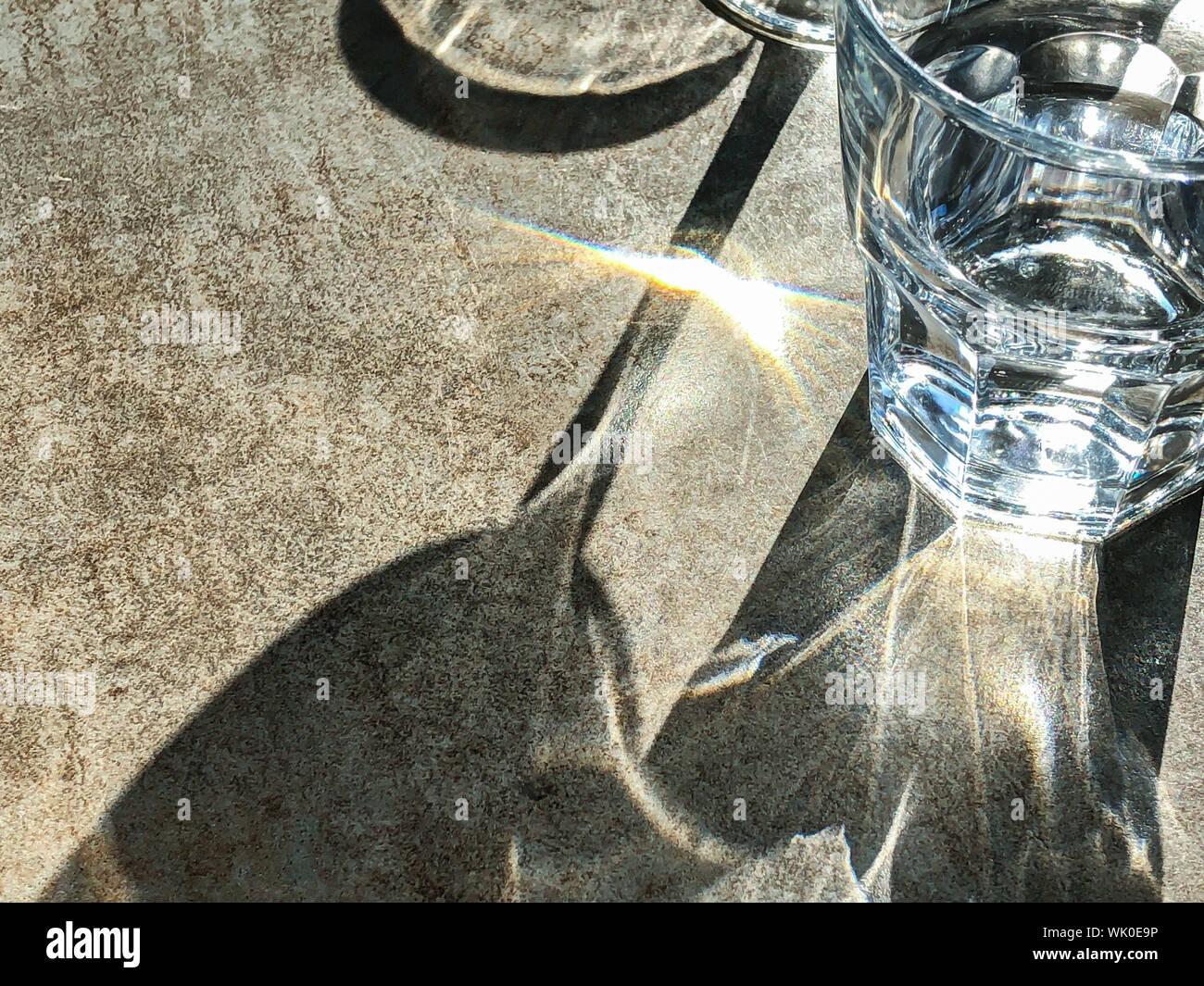 sunlight shine through glass. beautiful light and shadow on stone ...