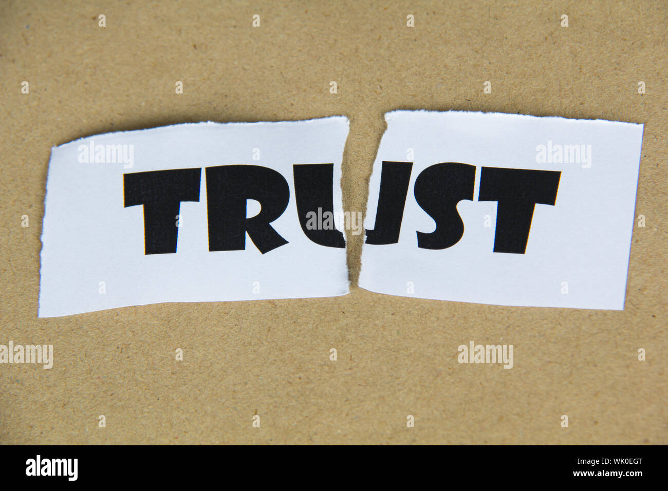 Torn trust representing broken trust concept Stock Photo - Alamy