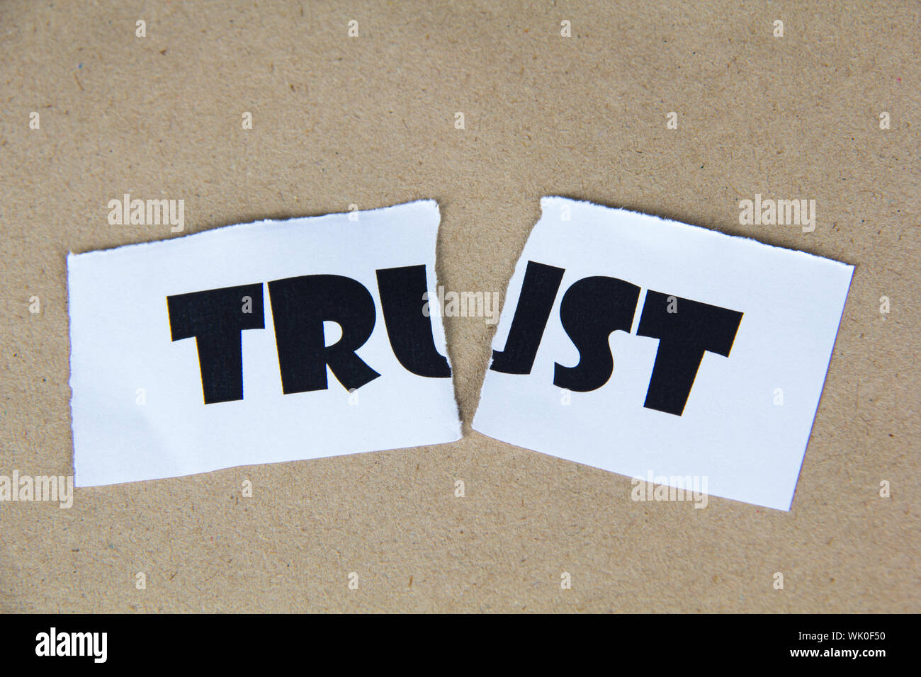 Torn trust representing broken trust concept Stock Photo - Alamy