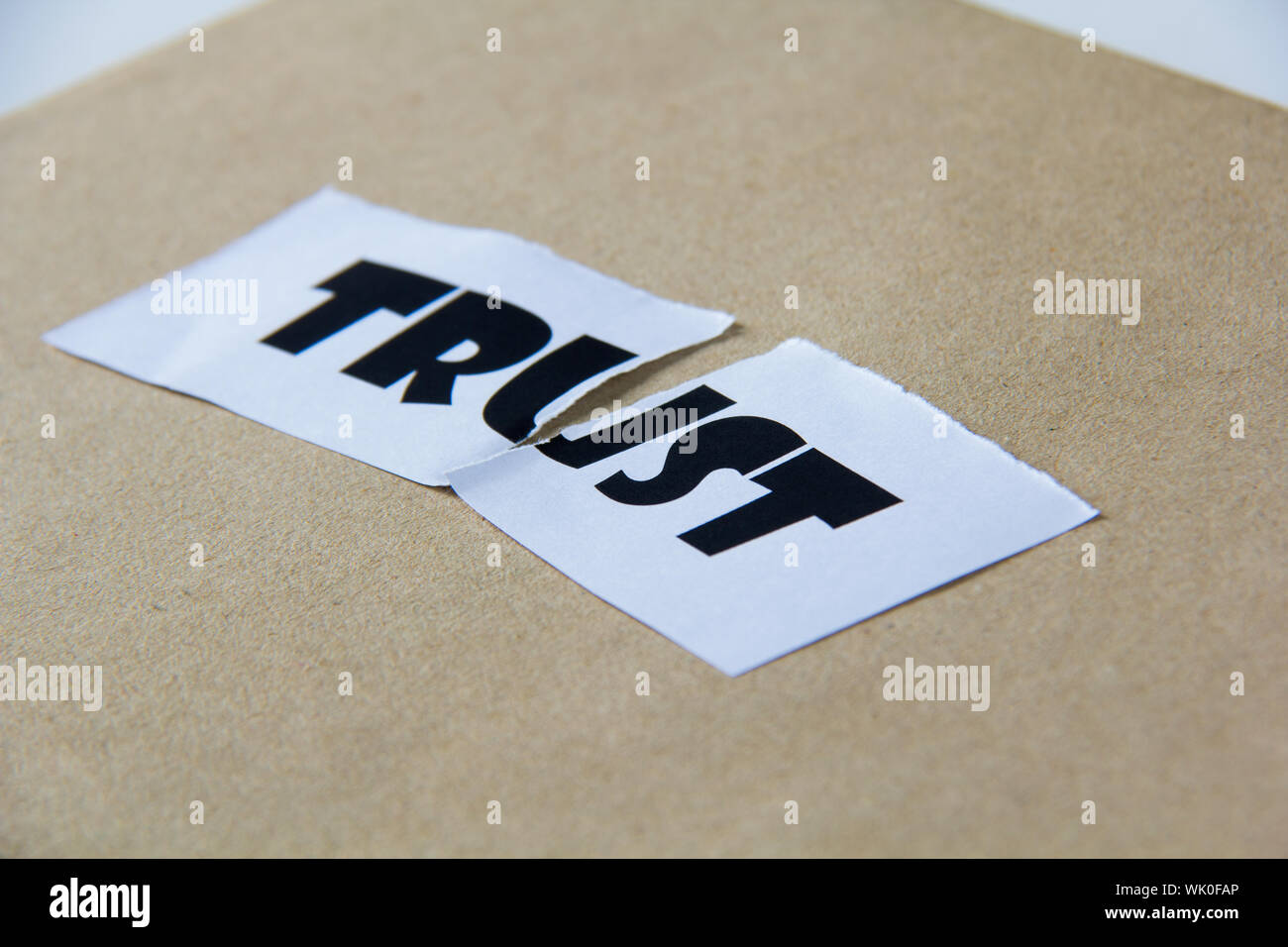 Torn trust representing broken trust concept Stock Photo - Alamy