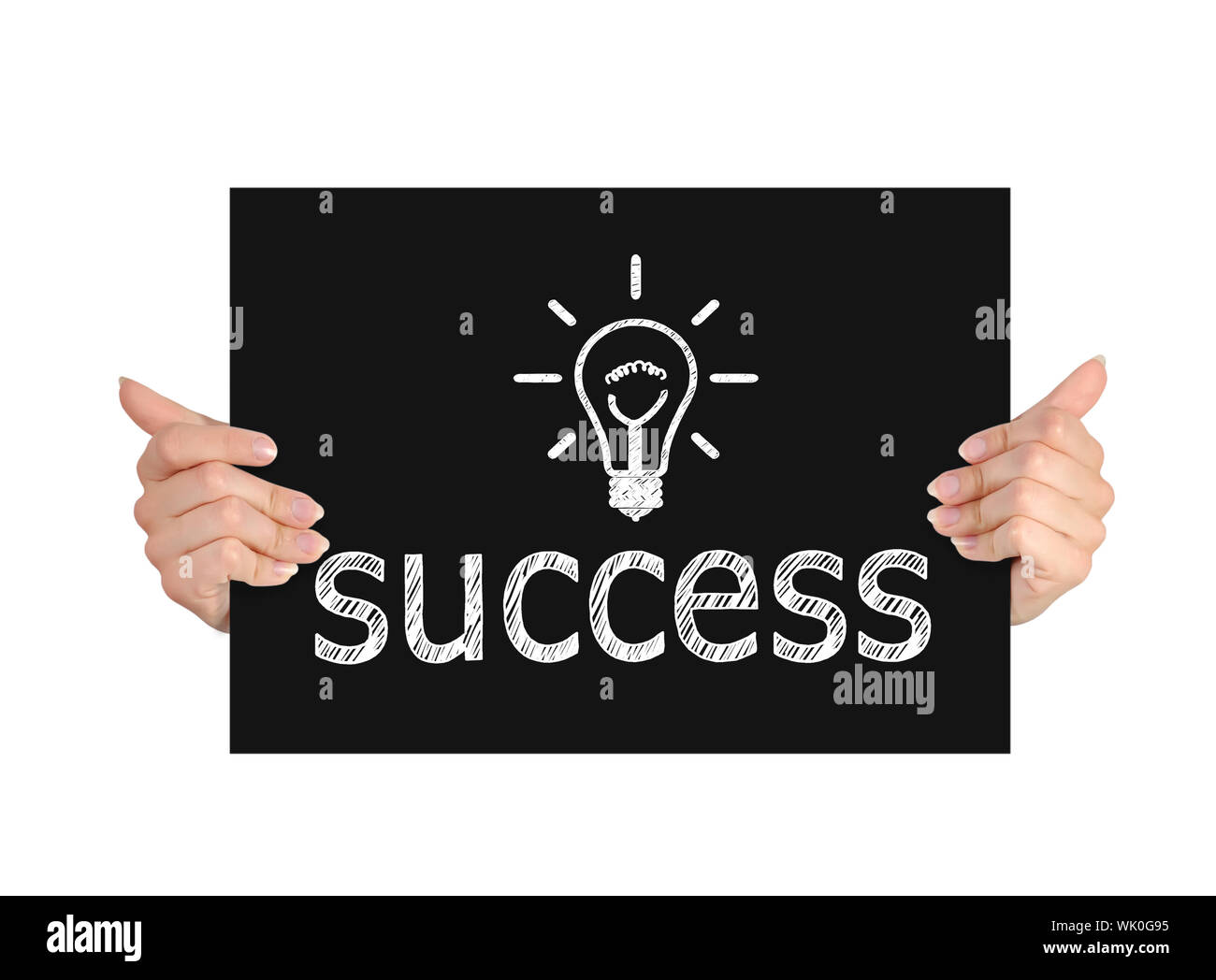 hands holding black paper with drawing success Stock Photo - Alamy
