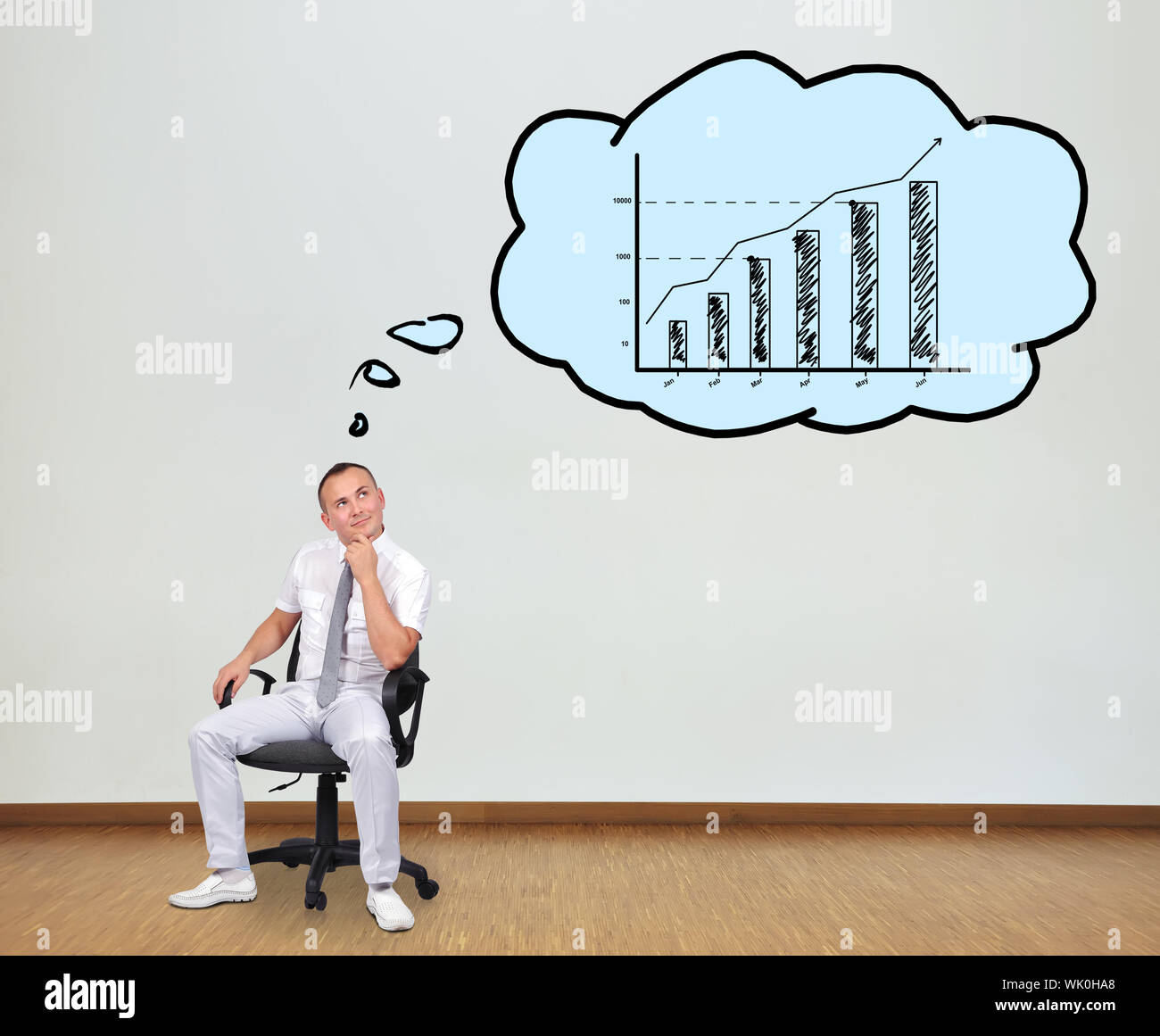 man sitting on chair and thinking about chart Stock Photo - Alamy