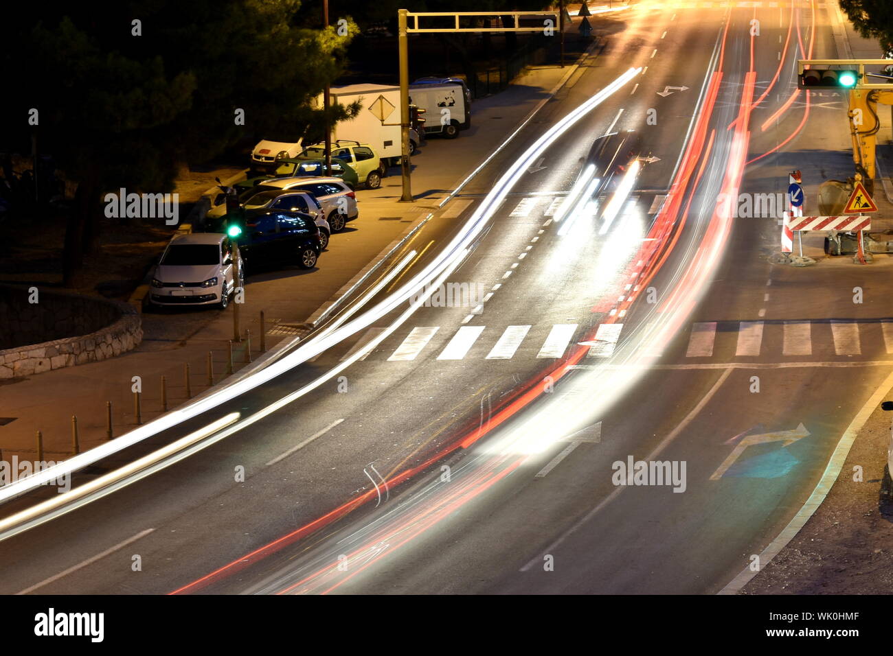 Traffic at dusk, light painting technique. Smeared car lights on the ...