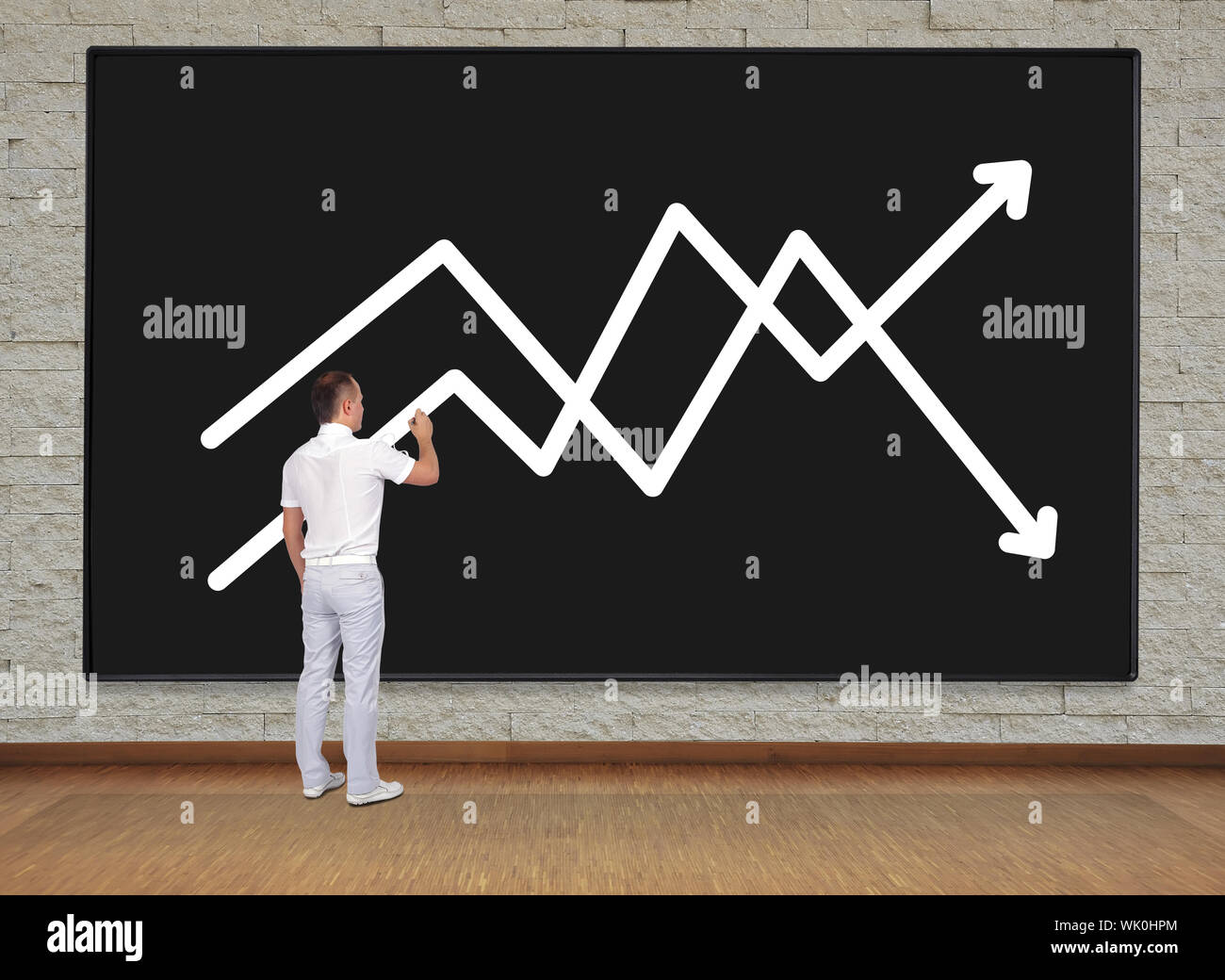 man standing and drawing chart Stock Photo - Alamy