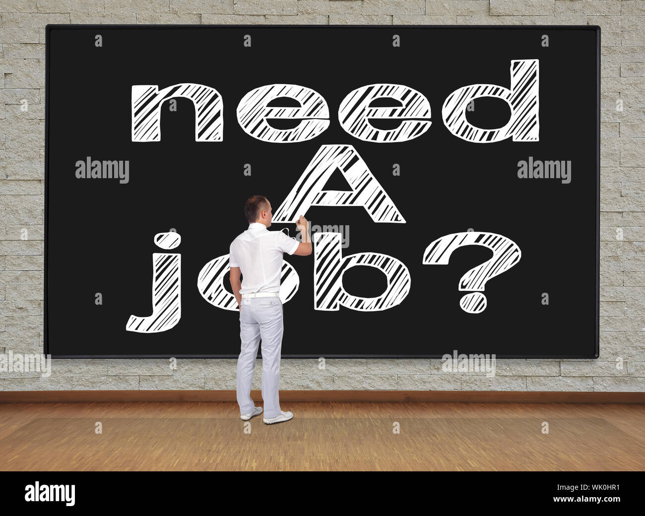 man standing and drawing need a job Stock Photo - Alamy