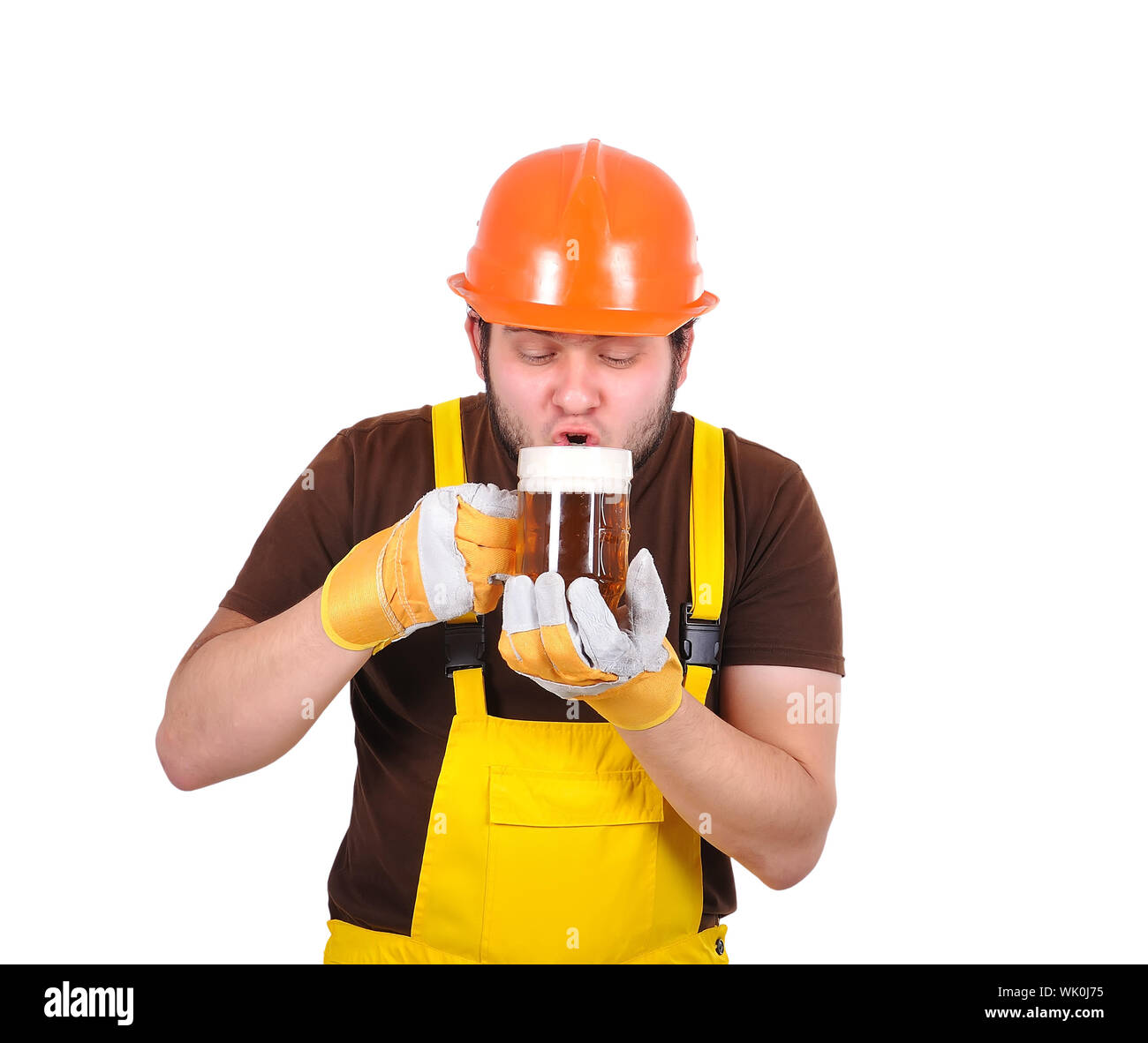 builder drinking beer on a white background Stock Photo - Alamy