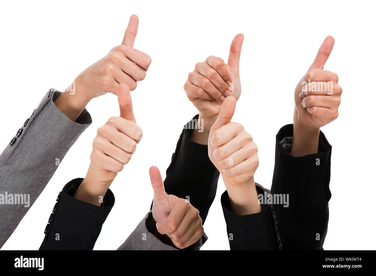 Sucess concept with hands making thumbs up over a white background ...