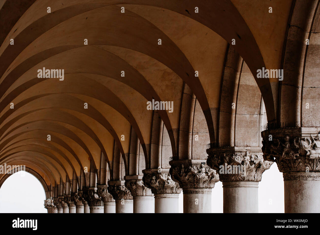 Photo of a row of arches and columns in Piazza San Marco in Venice ...
