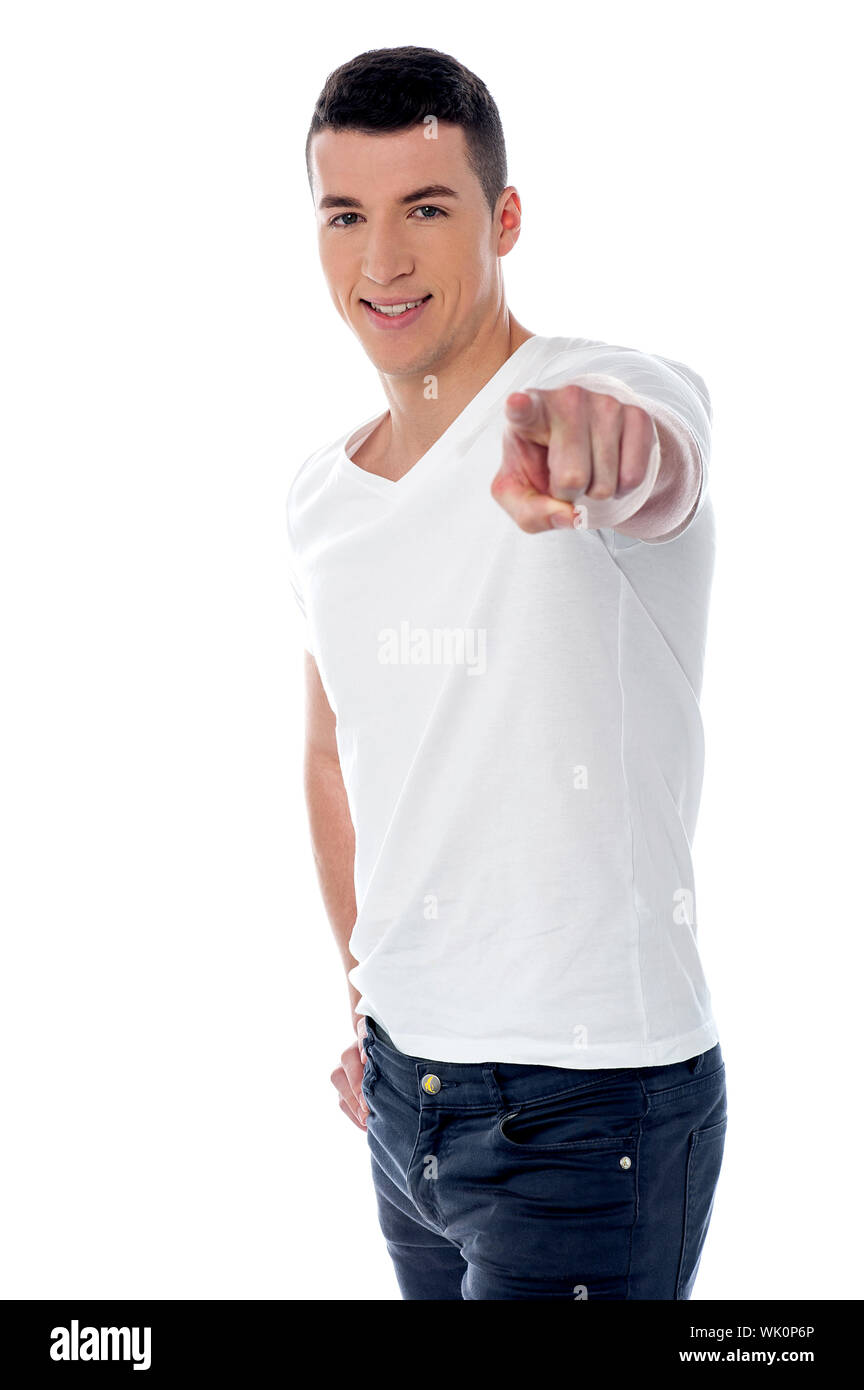 Casual cheerful guy pointing at camera Stock Photo - Alamy