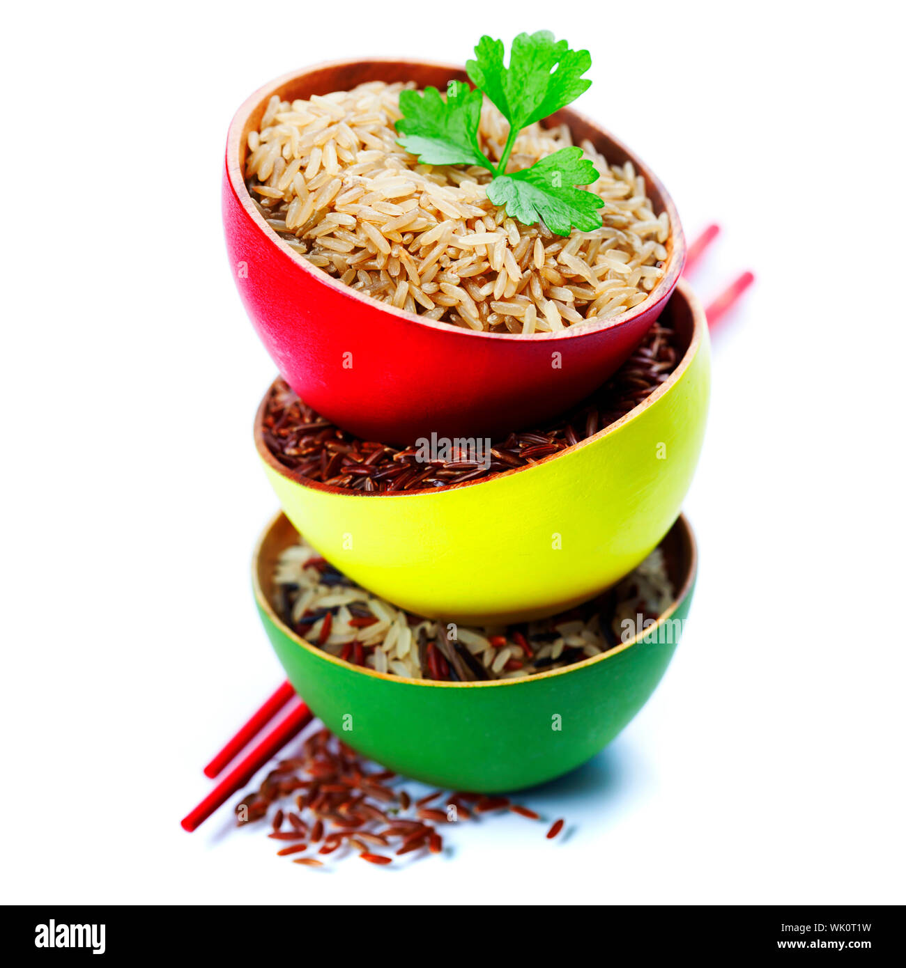 Three bowls with different types of rice on white background Stock ...
