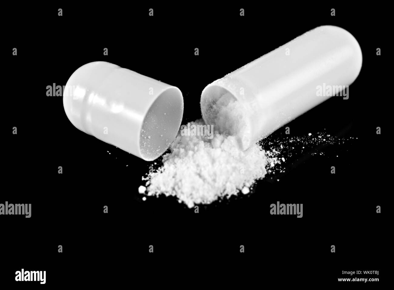 Open pill capsule Black and White Stock Photos & Images - Alamy