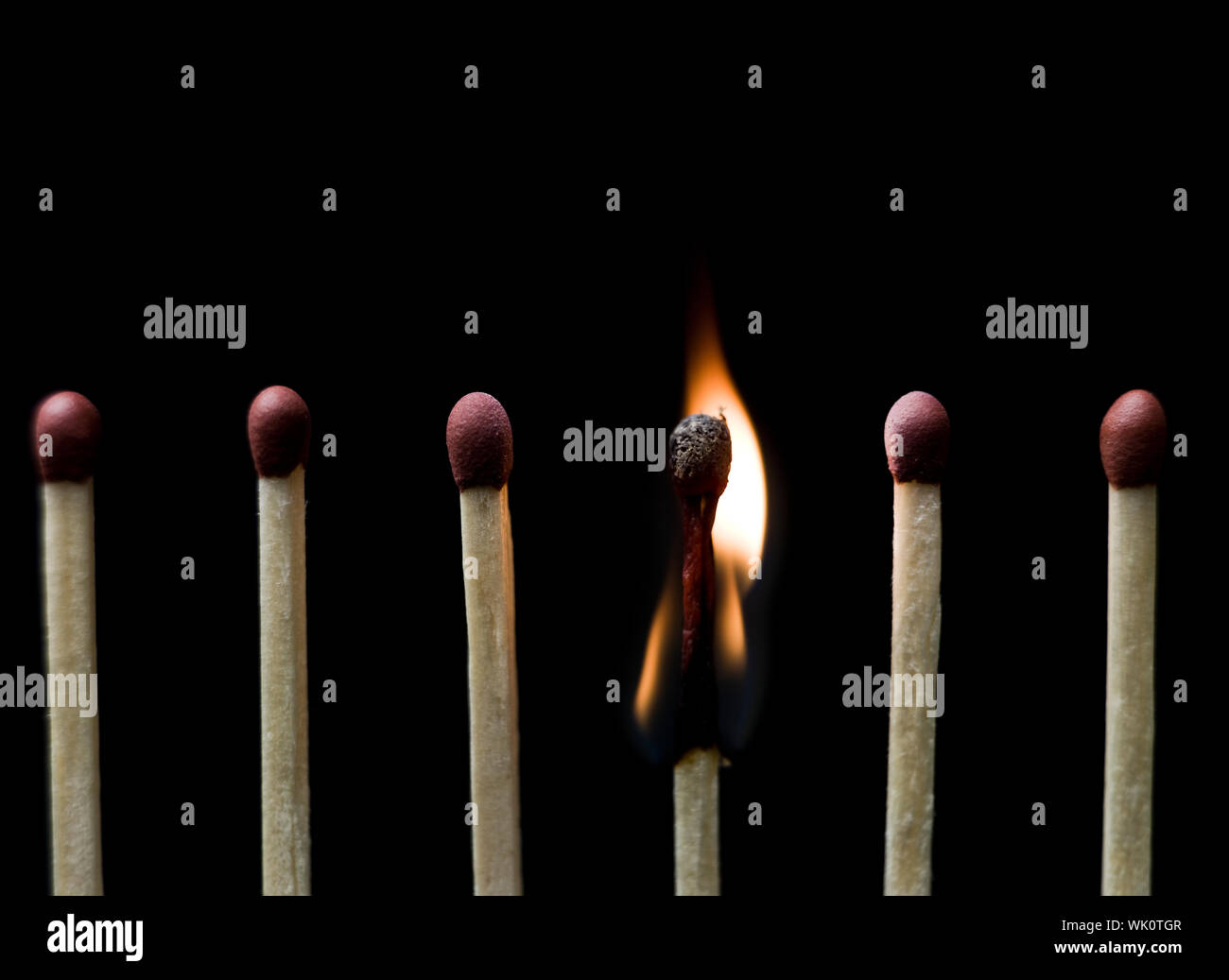 Group of Matches on black background Stock Photo - Alamy