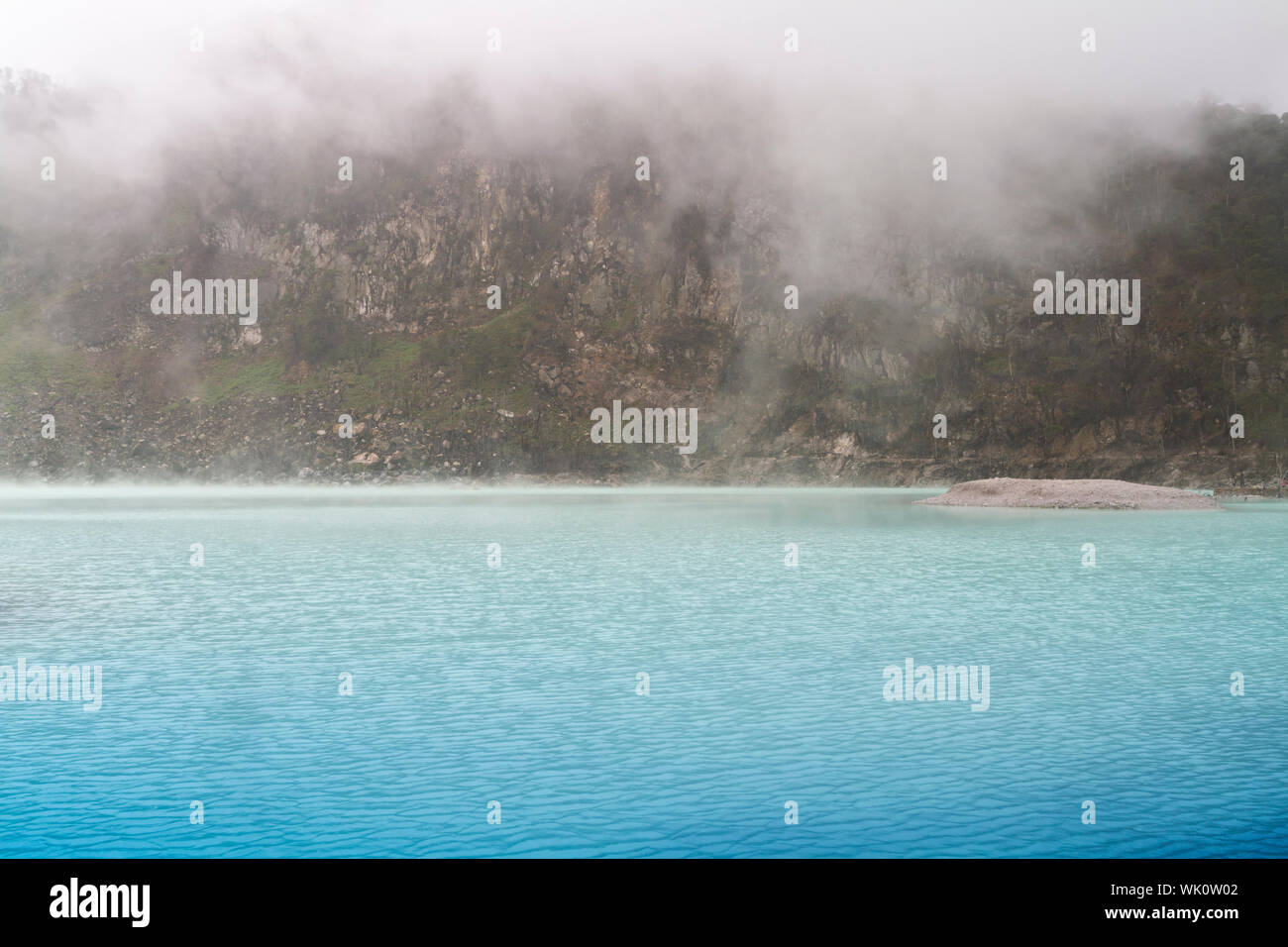 blue color lake surface in the volcano crater in Bandung, West Jawa ...