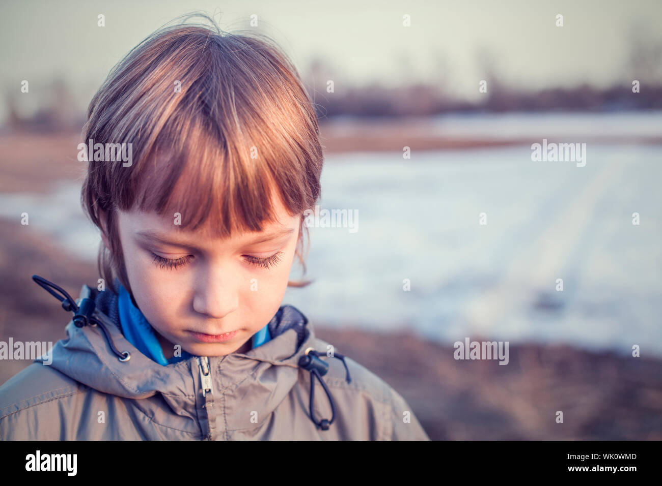 Sad Young Boy Stock Photo - Alamy