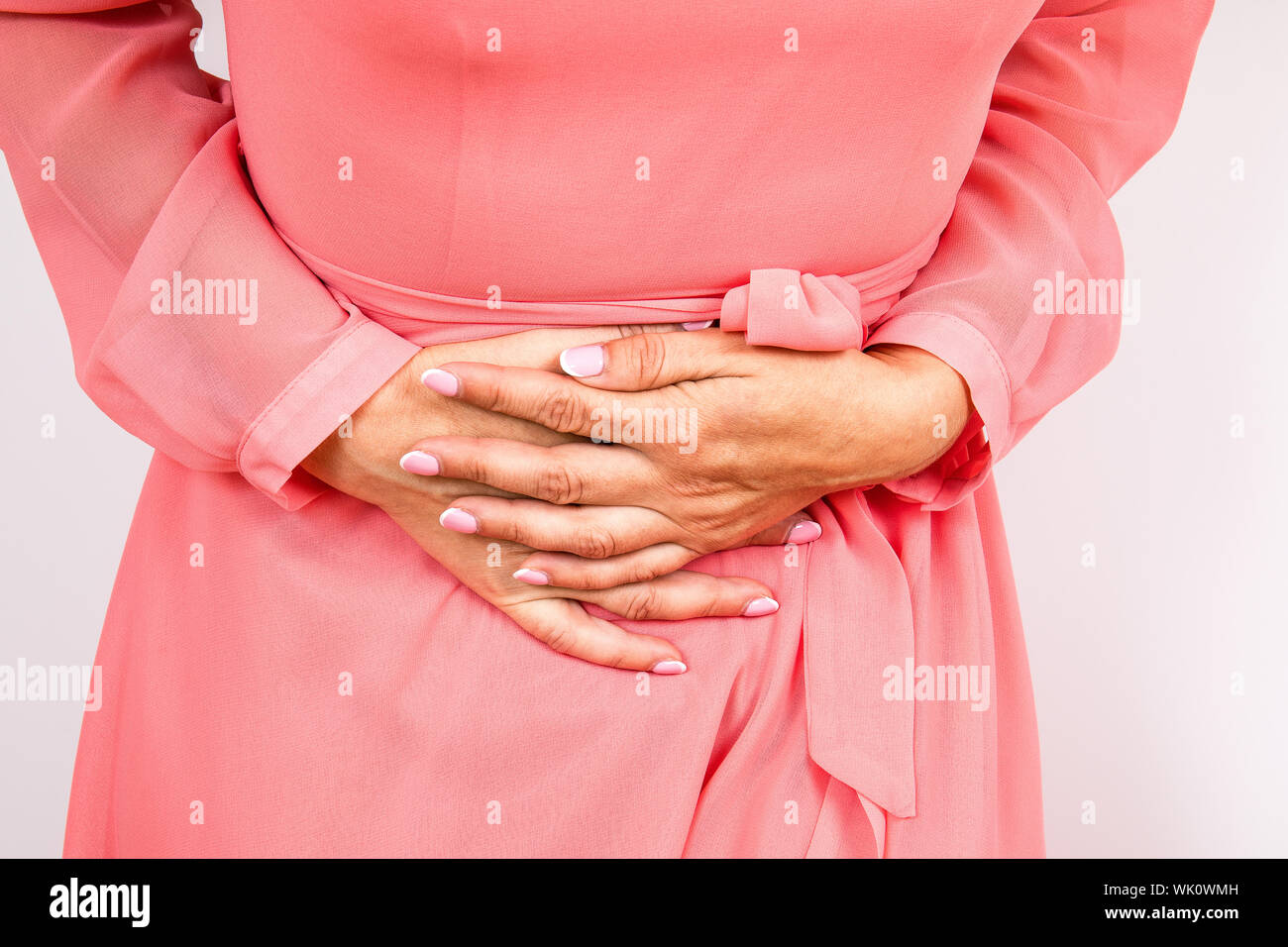 Abdominal cramps and pain Stock Photo - Alamy
