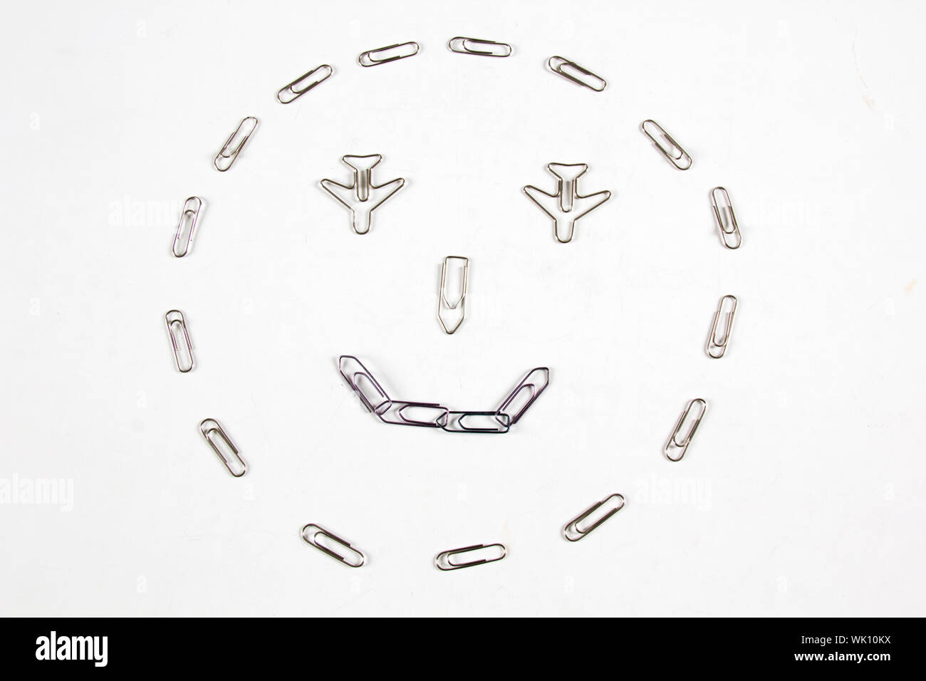 Smiley Face made from paper clips Stock Photo - Alamy