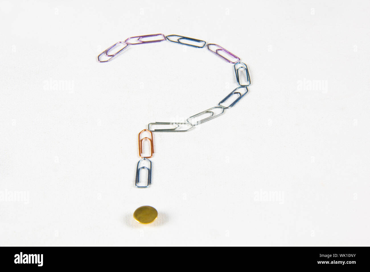 Symbol of question mark made from paper clip Stock Photo - Alamy