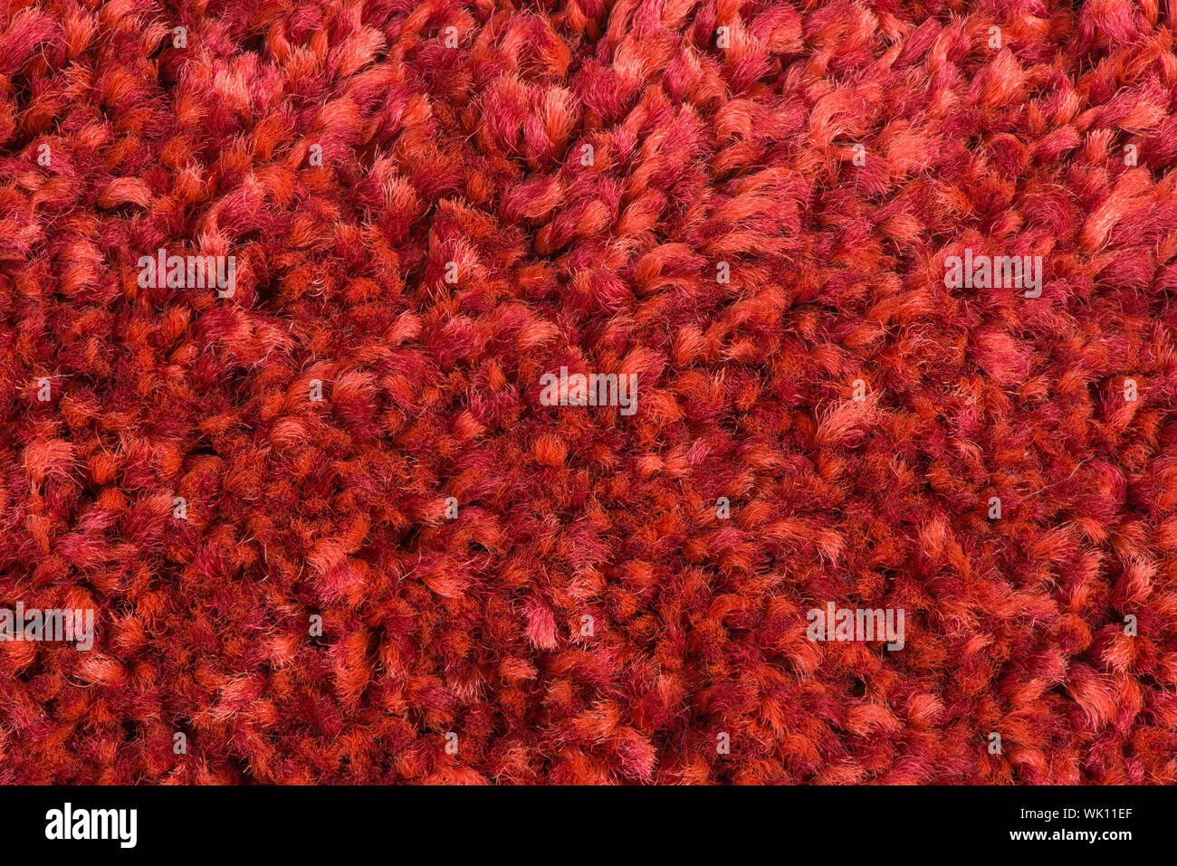 Closeup detail of red carpet texture background Stock Photo - Alamy
