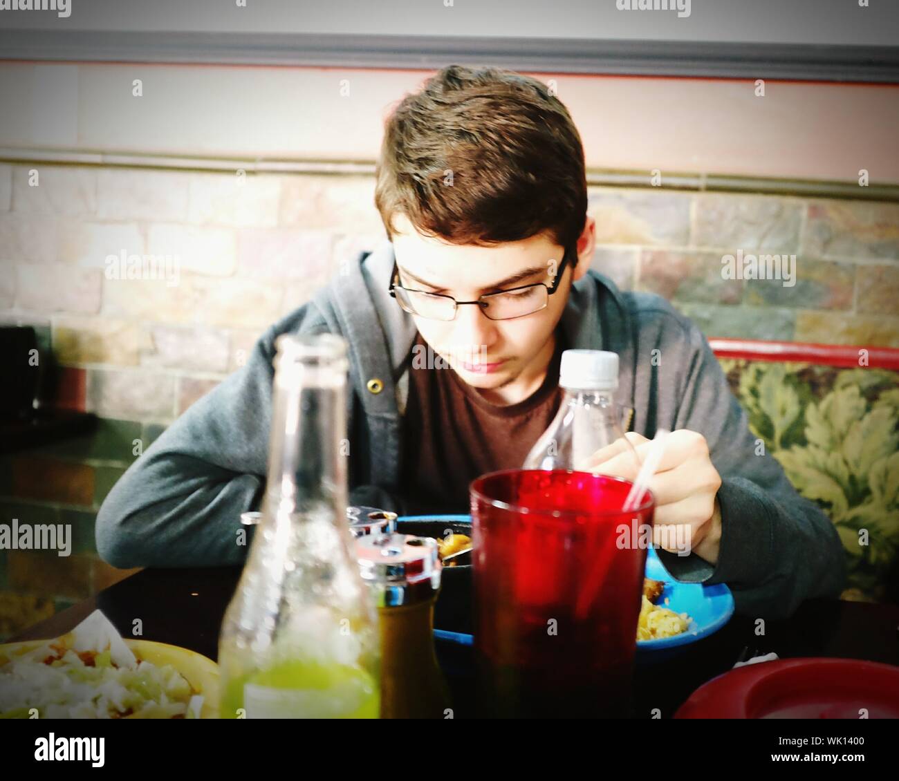 Boy at dining table hi-res stock photography and images - Alamy