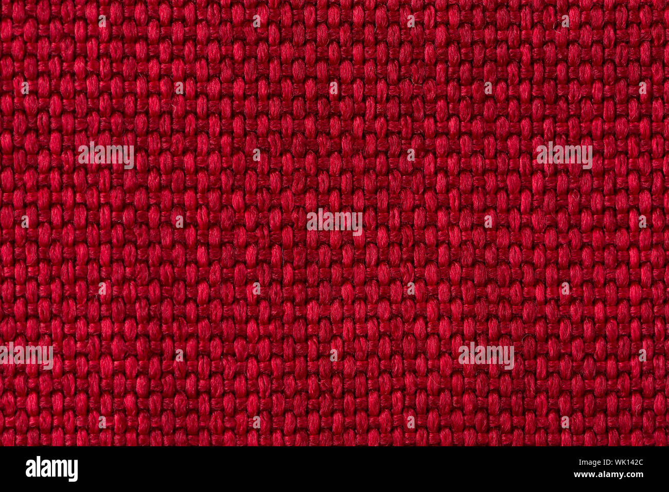 Closeup detail of red fabric texture background Stock Photo - Alamy