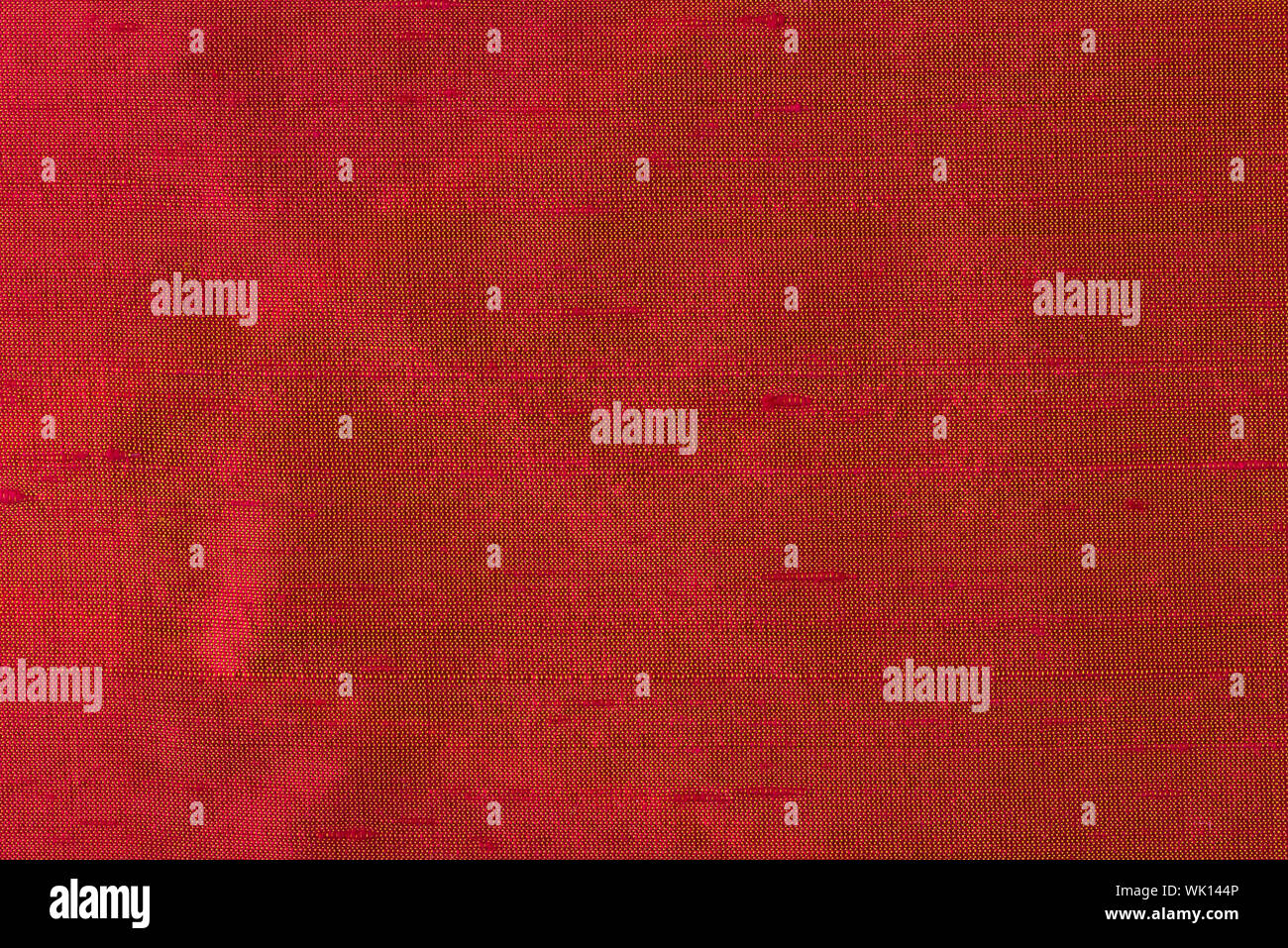 Closeup detail of red fabric texture background Stock Photo - Alamy