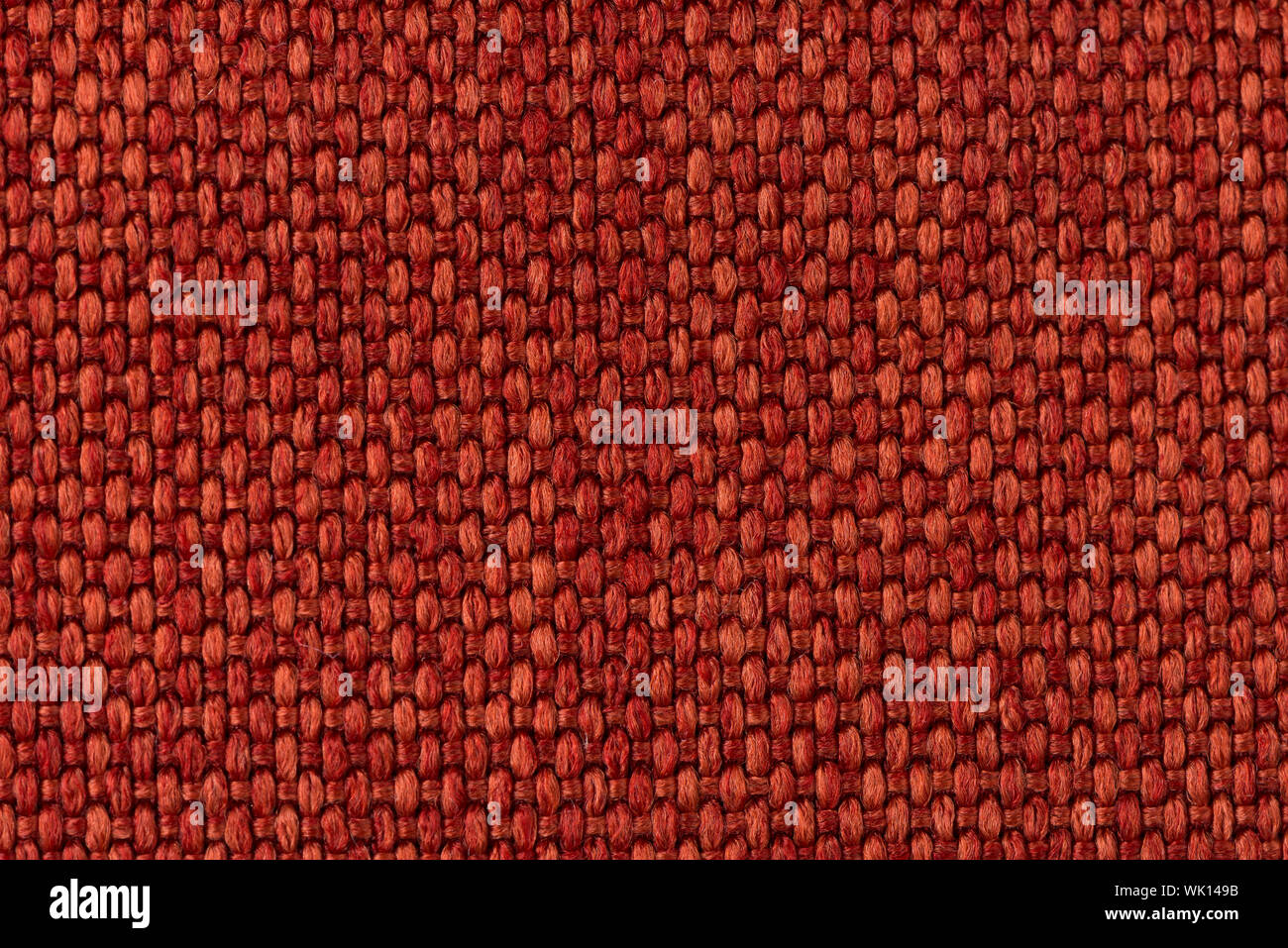 Closeup detail of red fabric texture background Stock Photo - Alamy