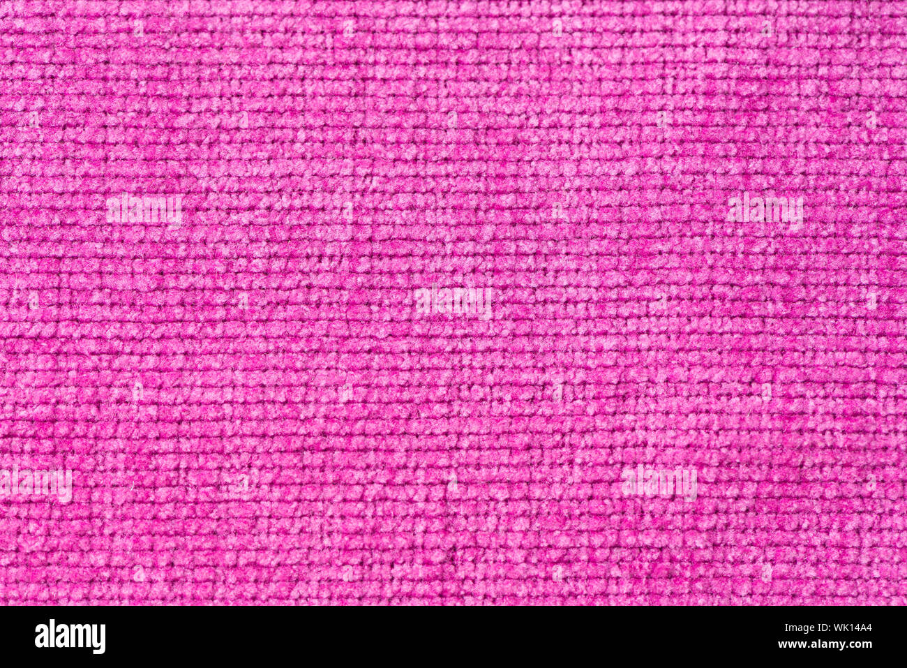 Closeup detail of pink fabric texture background Stock Photo - Alamy
