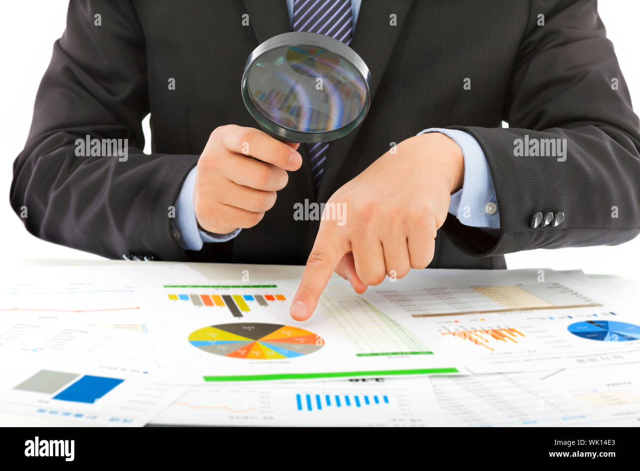 Businessman reading stock market chart hi-res stock photography and ...