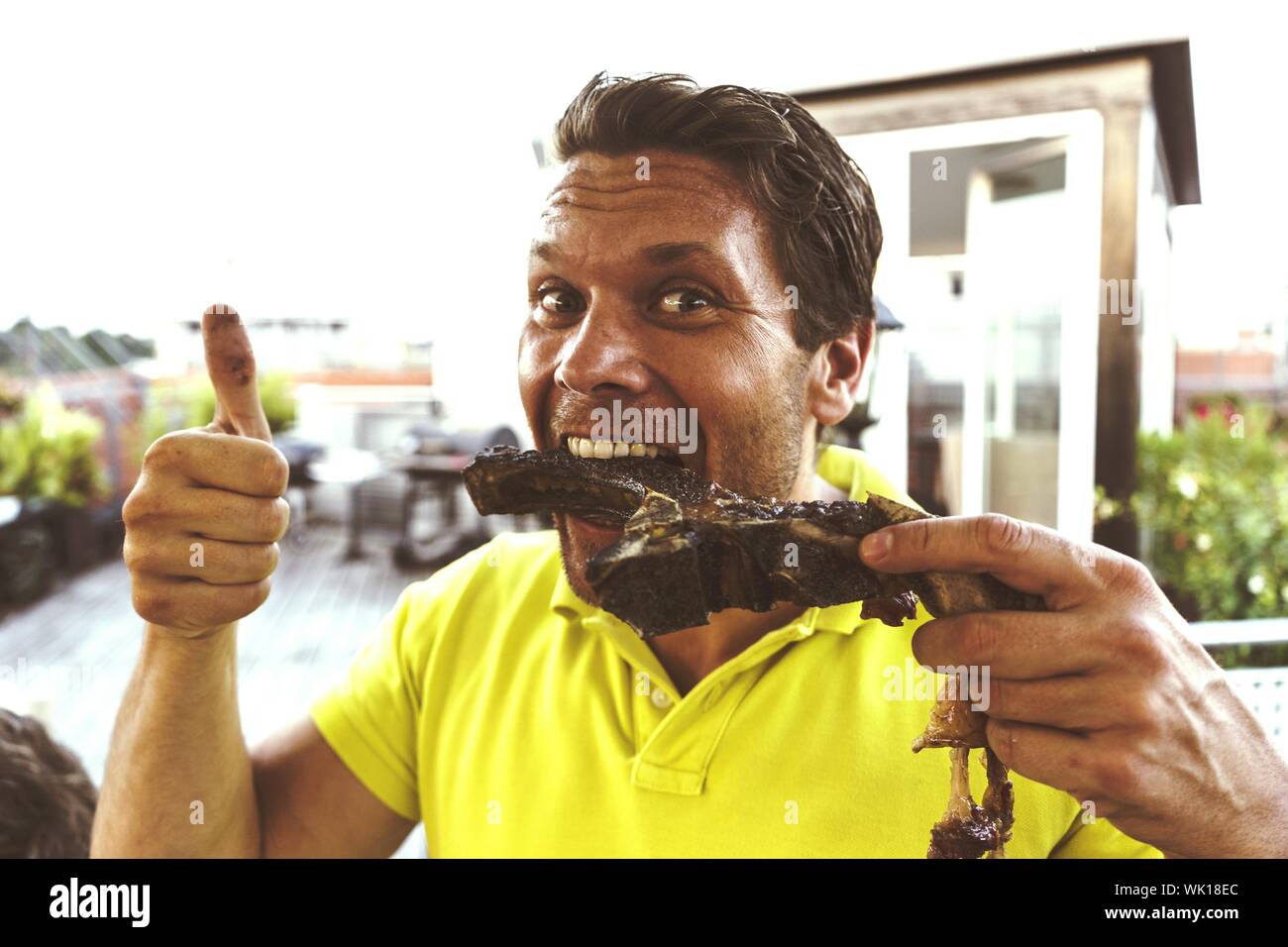 Food Eating Thumbs High Resolution Stock Photography and Images - Alamy