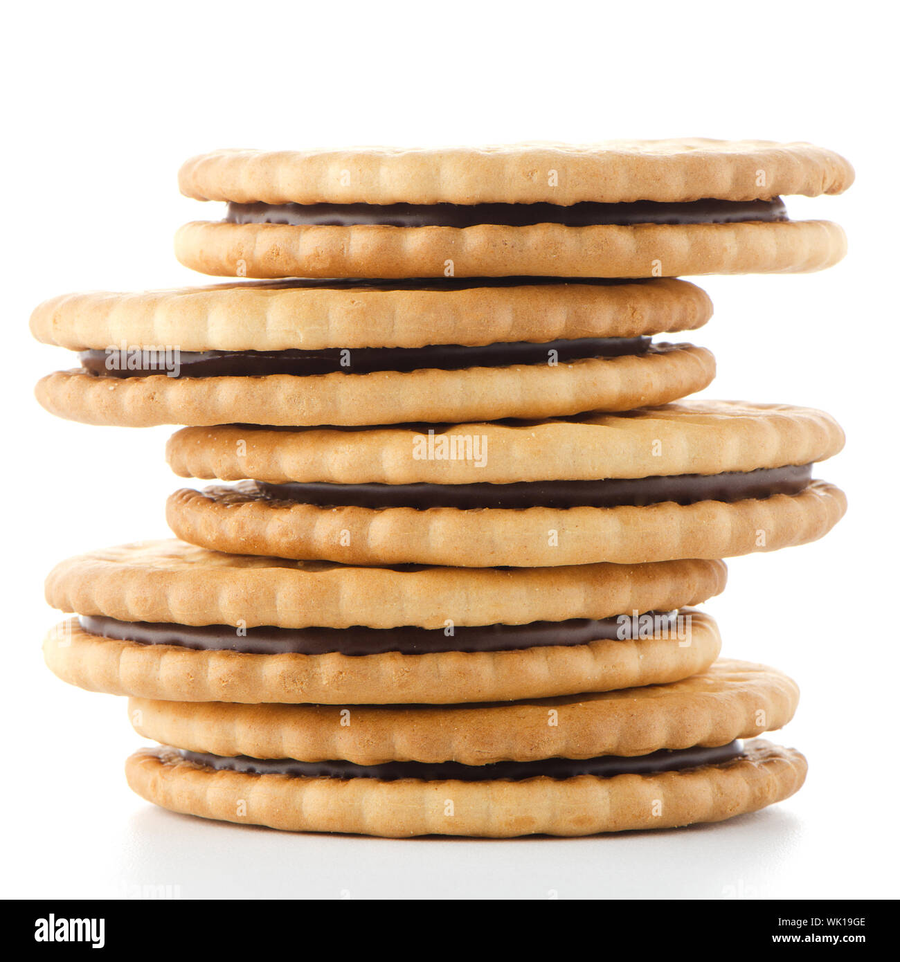 Sandwich biscuits with chocolate filling on a white background Stock ...