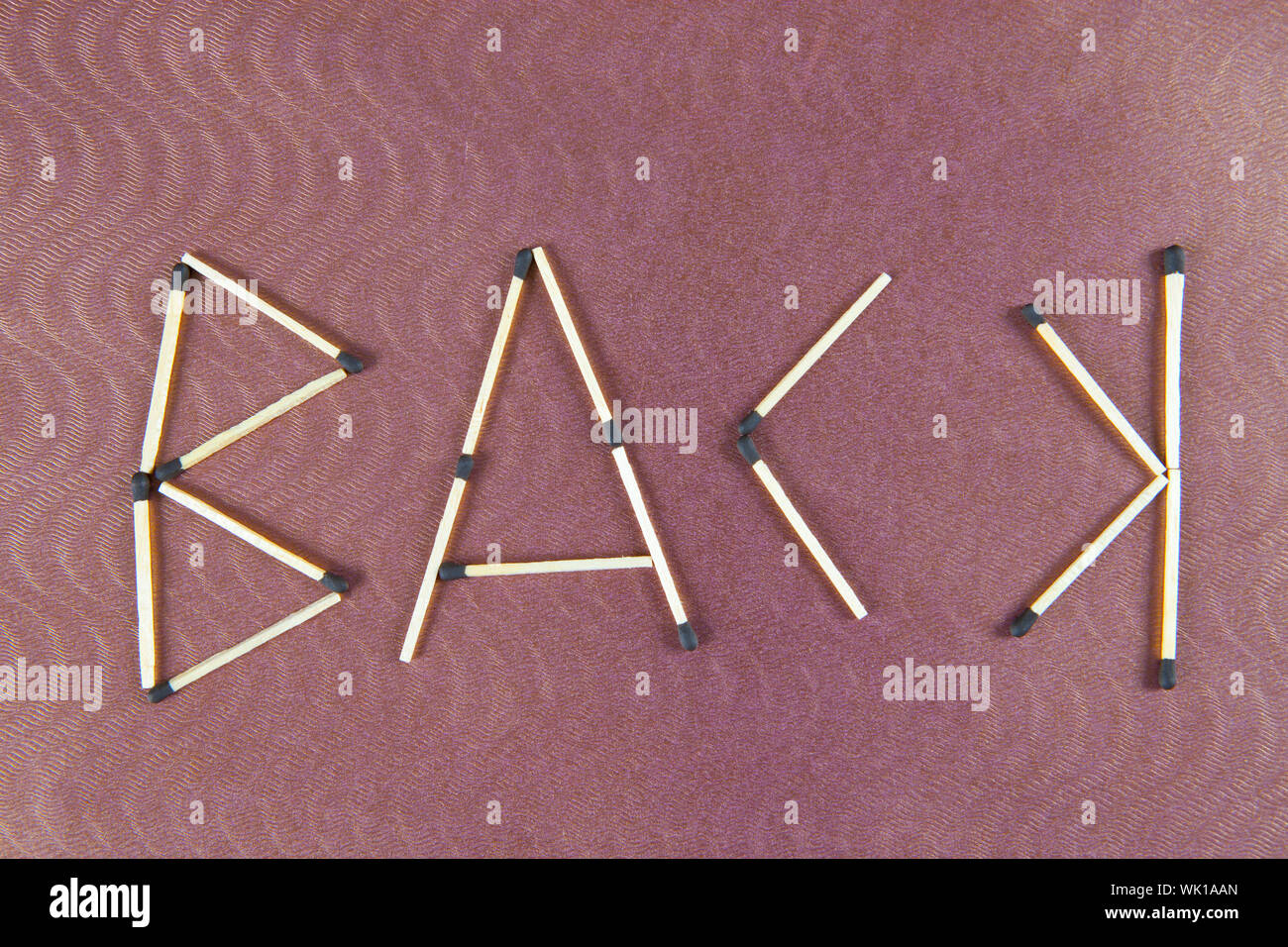 Back word created with matchstick on fabric texture Stock Photo - Alamy