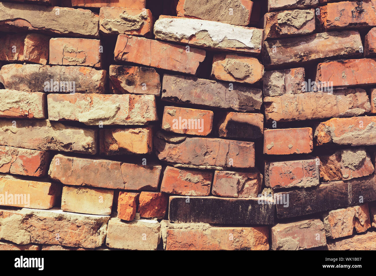 abstract background of piled old red bricks Stock Photo - Alamy