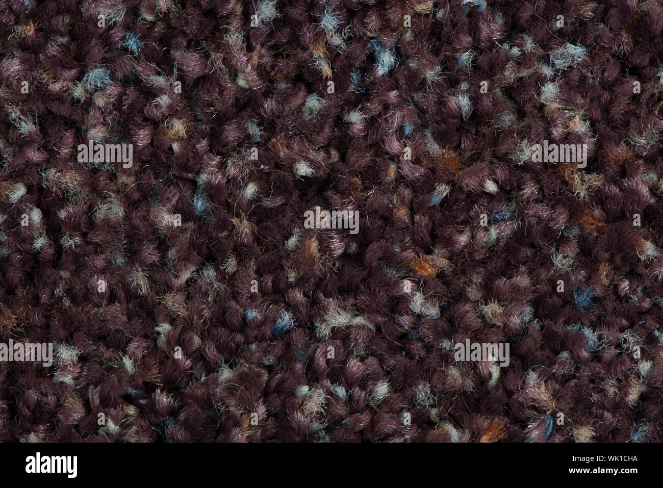 Closeup detail of purple carpet texture background Stock Photo - Alamy