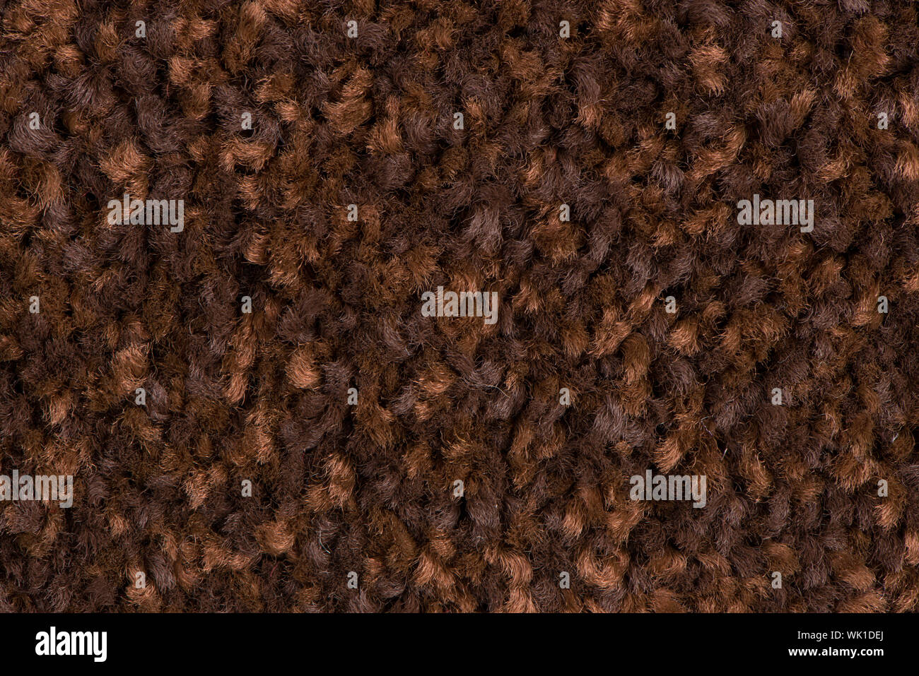 Closeup detail of brown carpet texture background Stock Photo - Alamy
