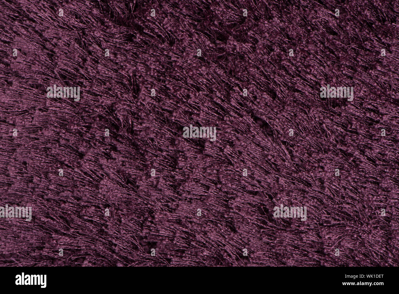 Closeup detail of purple carpet texture background Stock Photo - Alamy