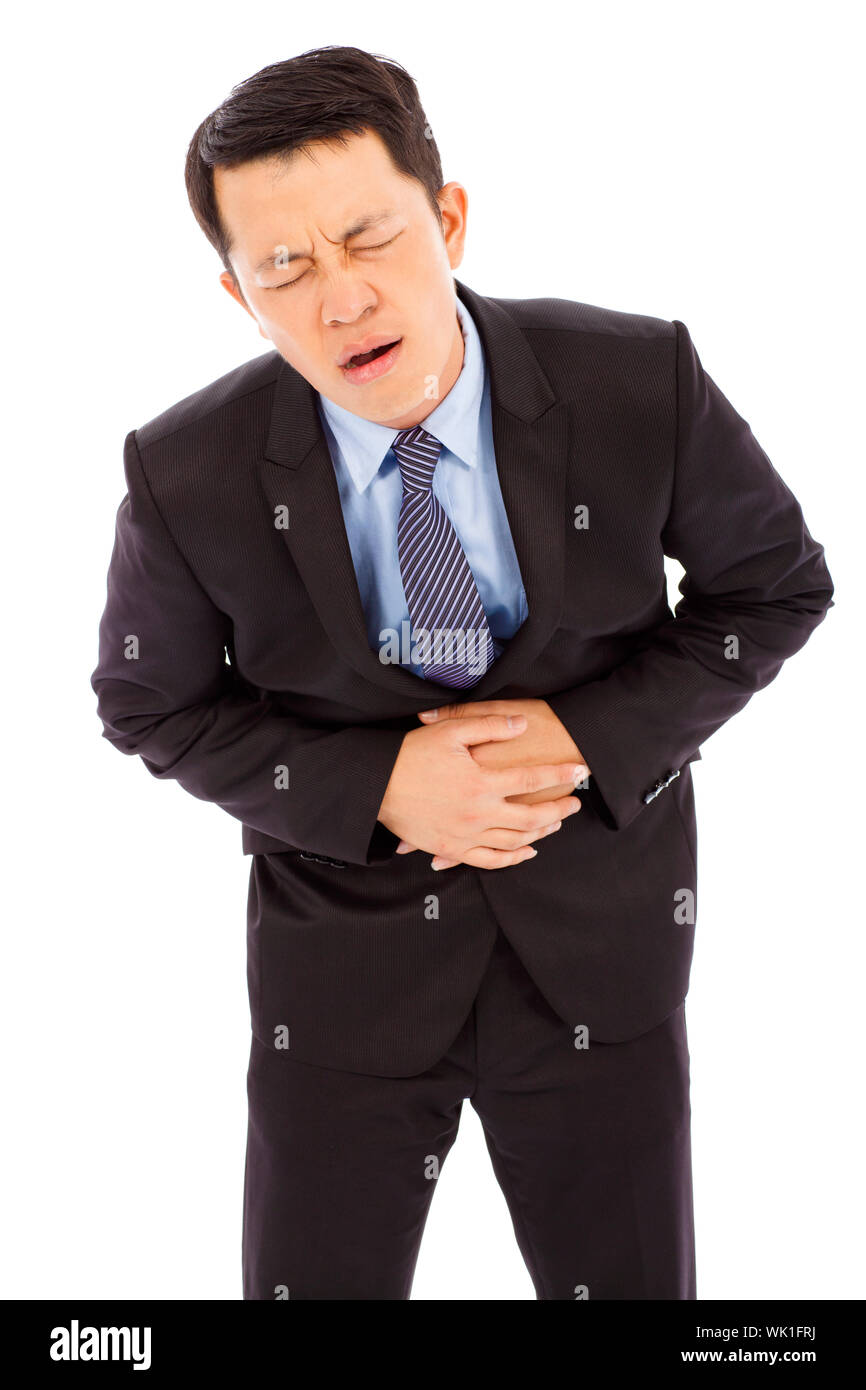 businessman feeling uncomfortable with painful expression Stock Photo ...