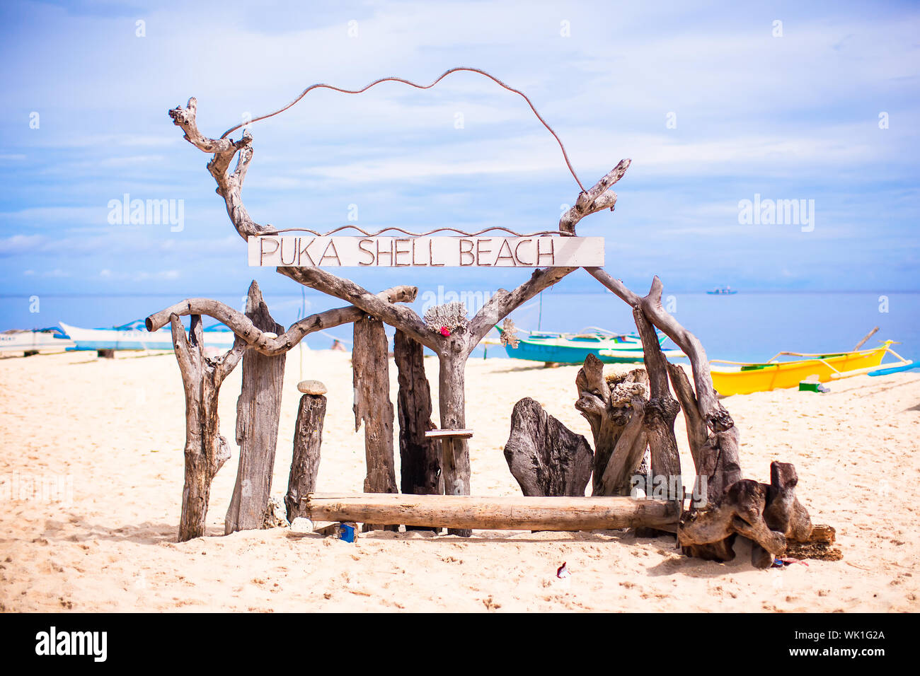 Title Puka beach on background blue sky in Boracay island Stock Photo ...