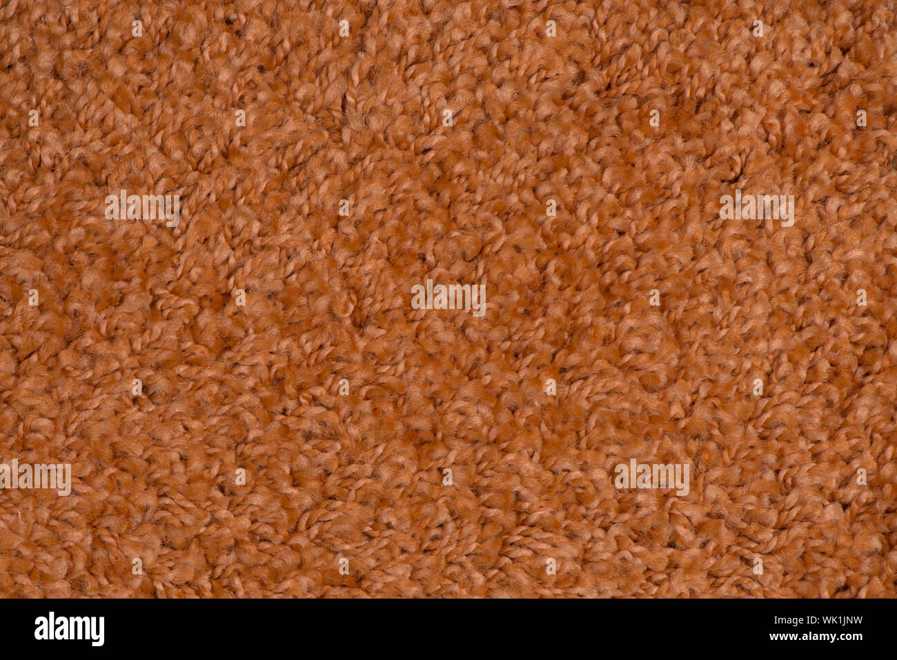 Closeup detail of brown carpet texture background Stock Photo - Alamy