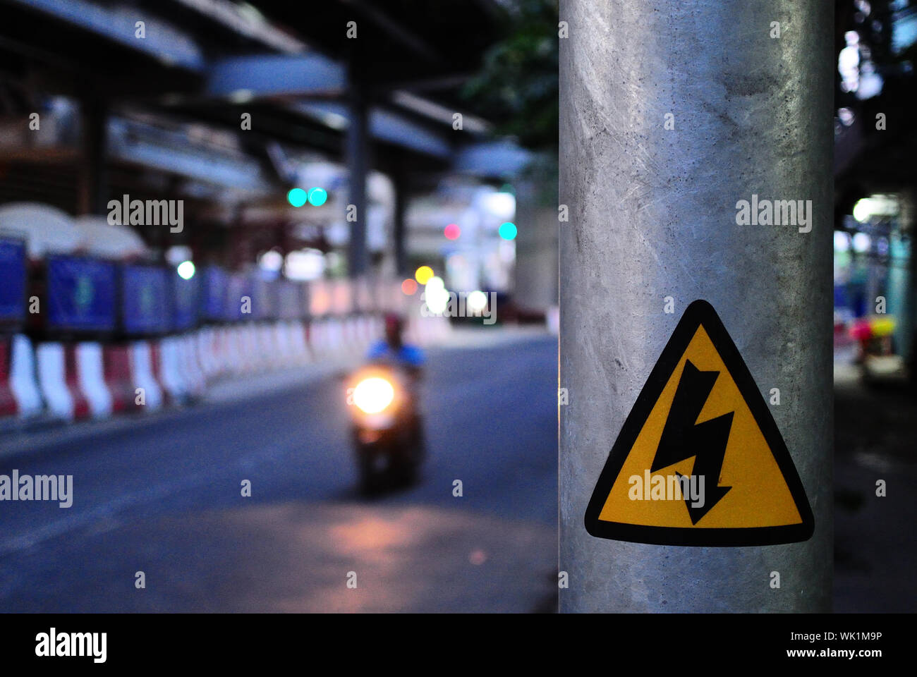 Warning sign on electricity pole hi-res stock photography and images ...